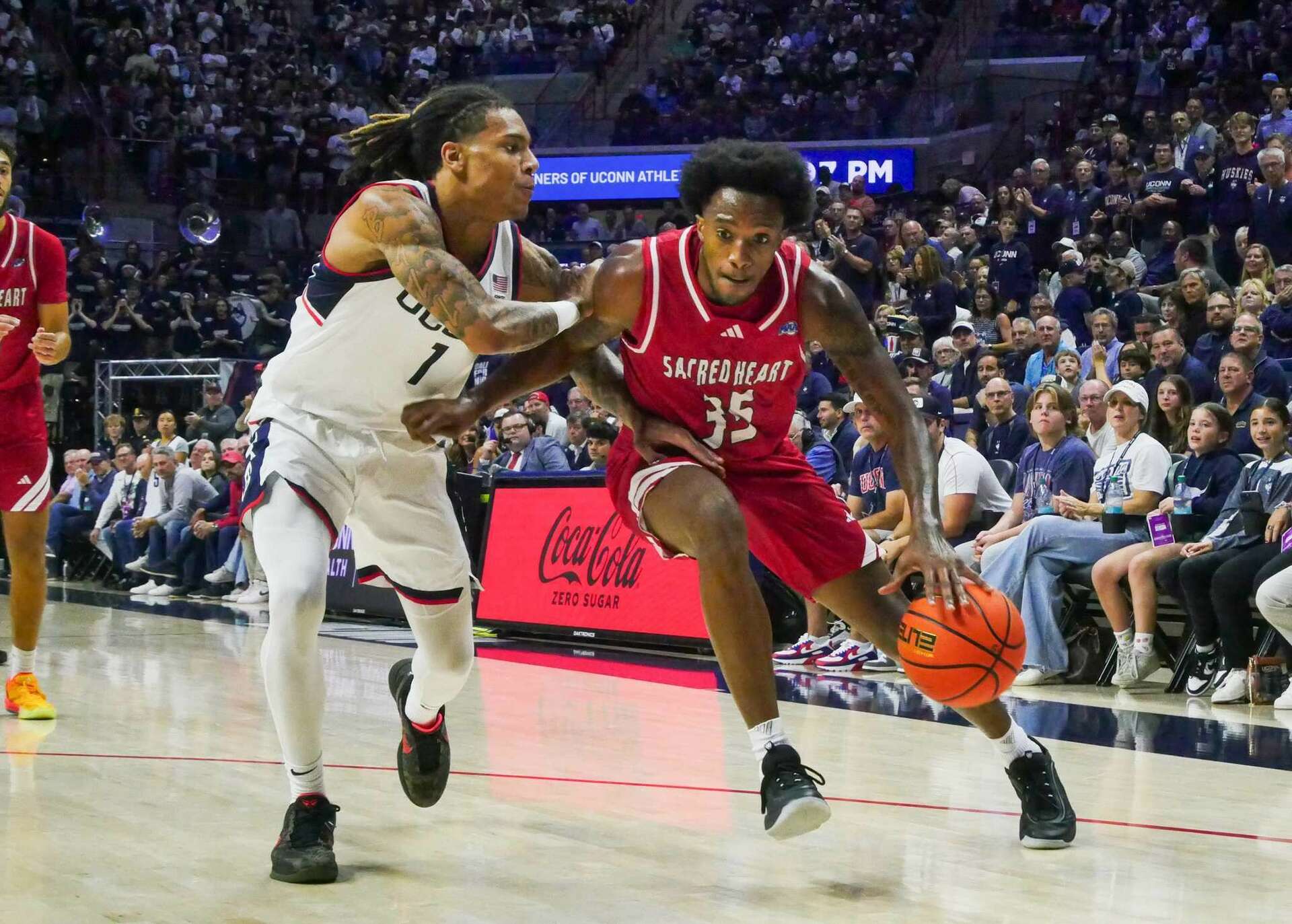 UConn men win opener behind Alex Karaban, Liam McNeeley, Solo Ball