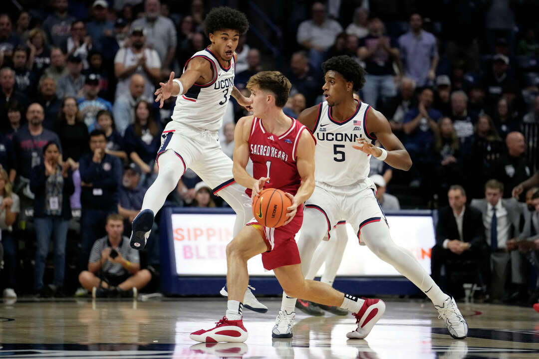 UConn men win opener behind Alex Karaban, Liam McNeeley, Solo Ball