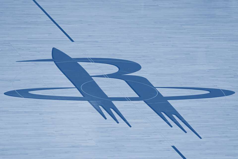 What is the history and meaning of the Houston Rockets logo, uniform?