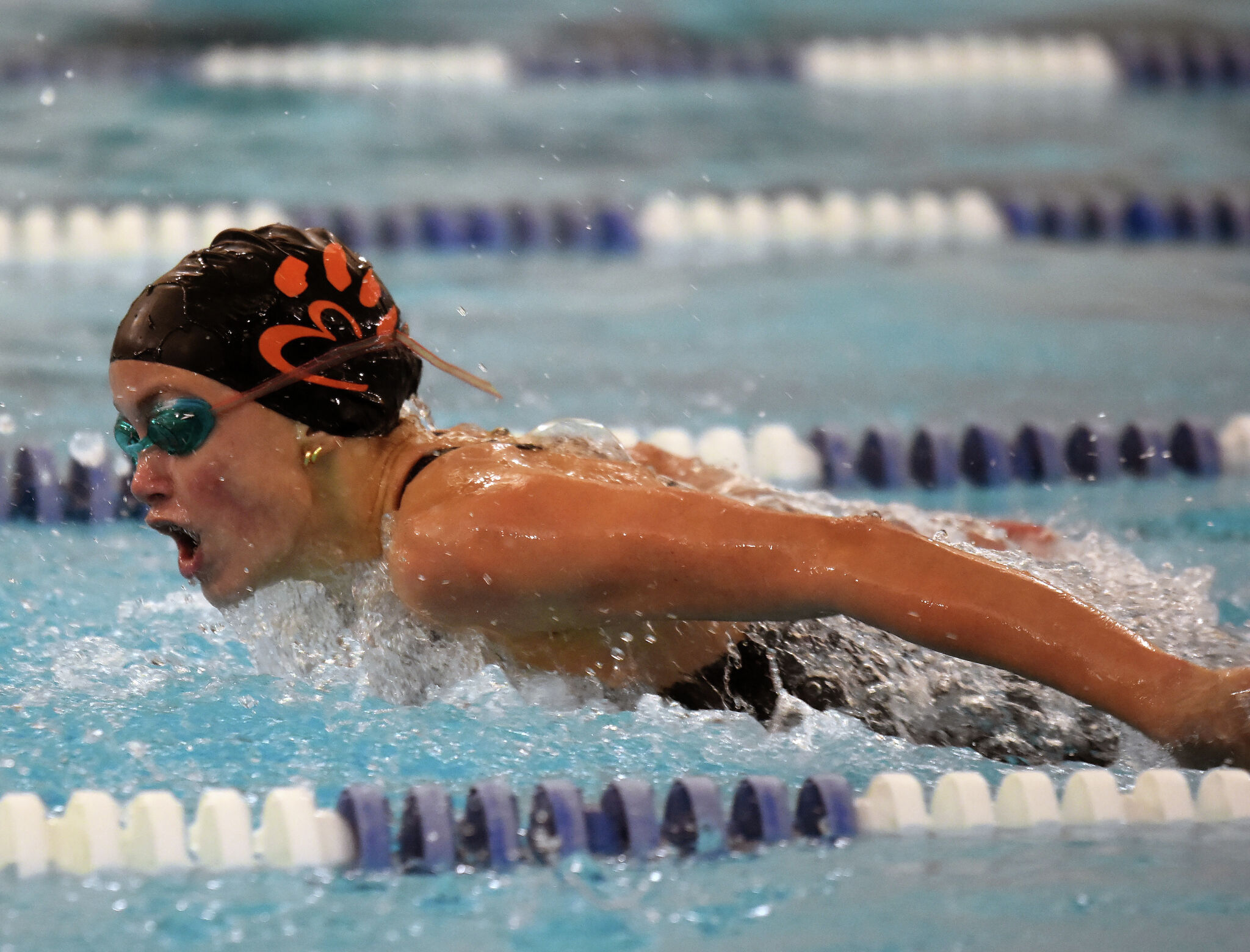 Edwardsville swimmers open with road victory