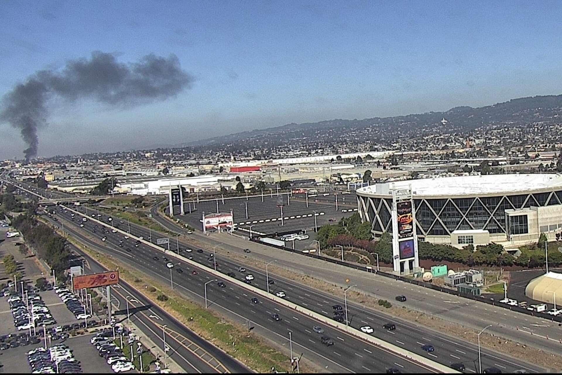Oakland fire displaces 13, sends massive plumes of smoke into the air
