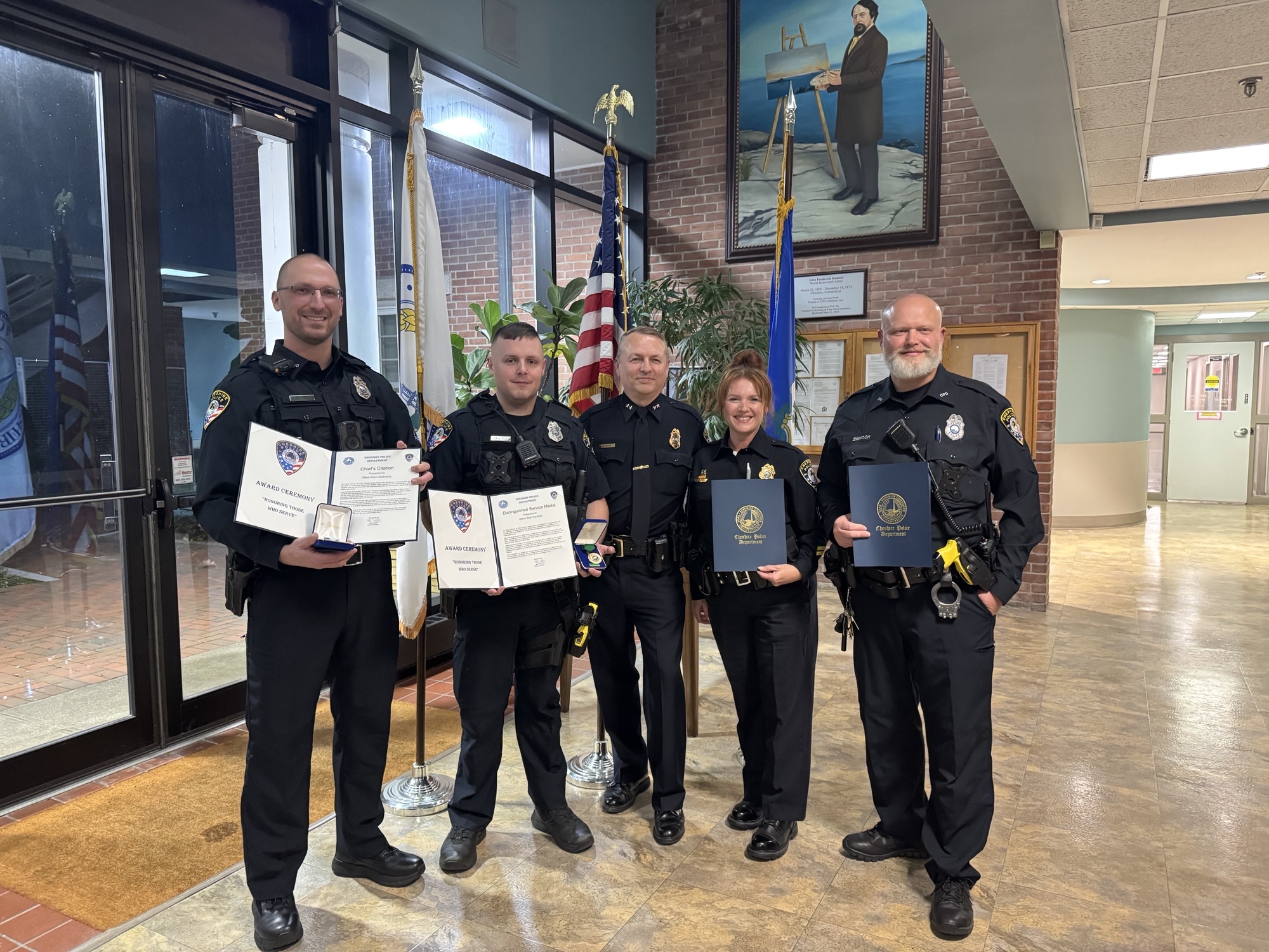 Cheshire firefighters, police saved four people and a dog in fire