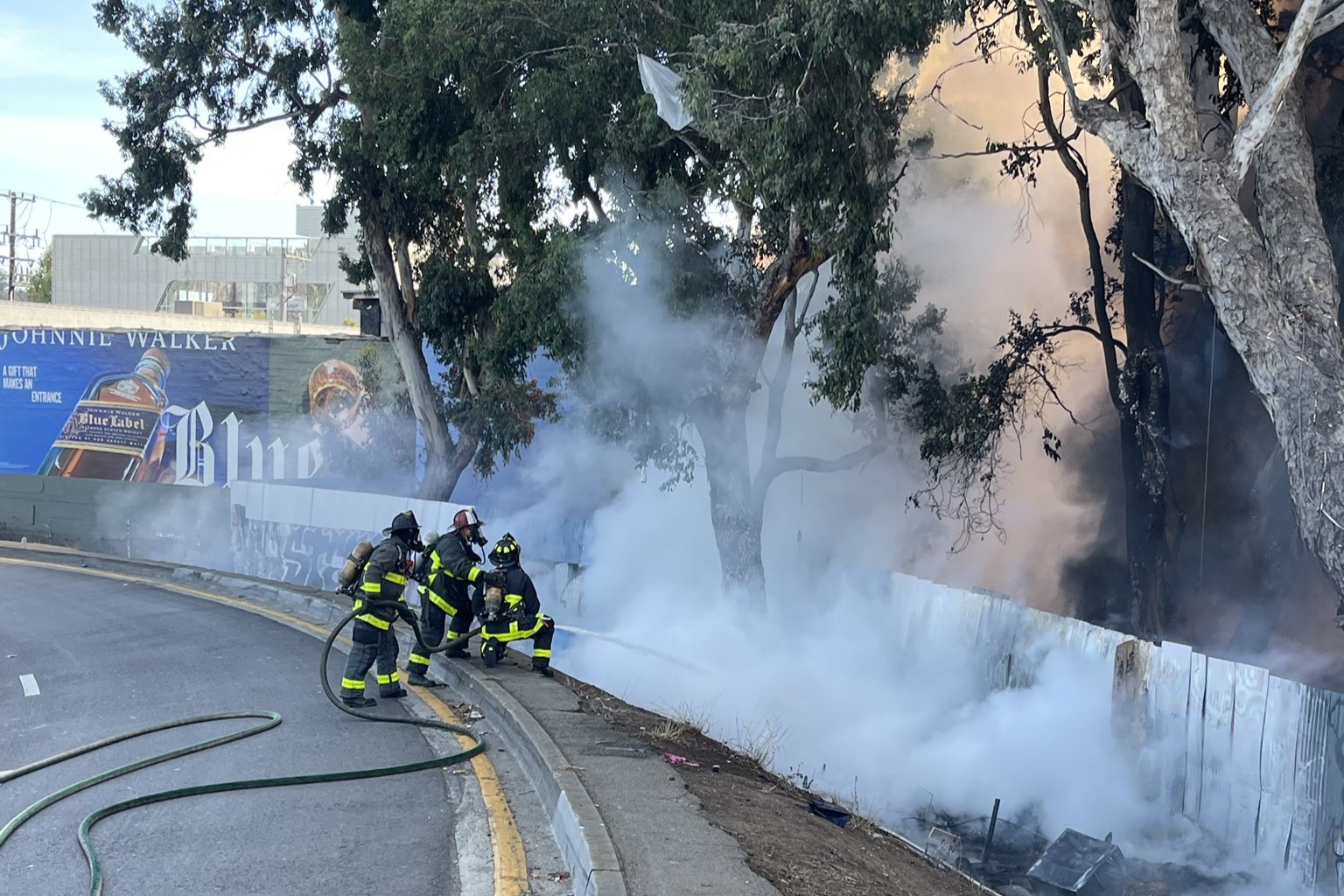 SF firefighters extinguish large encampment fire South of Market