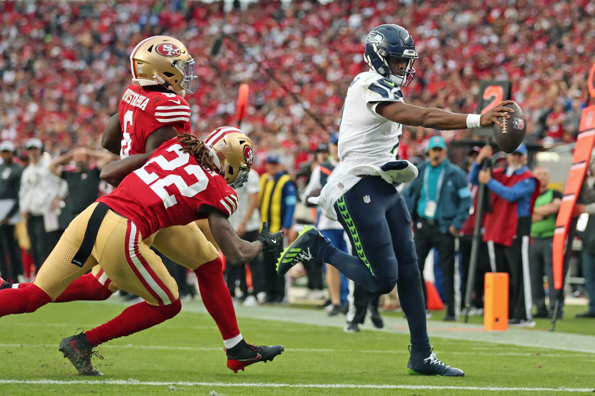 49ers falter late as Seahawks come back for 20-17 win after Bosa exits