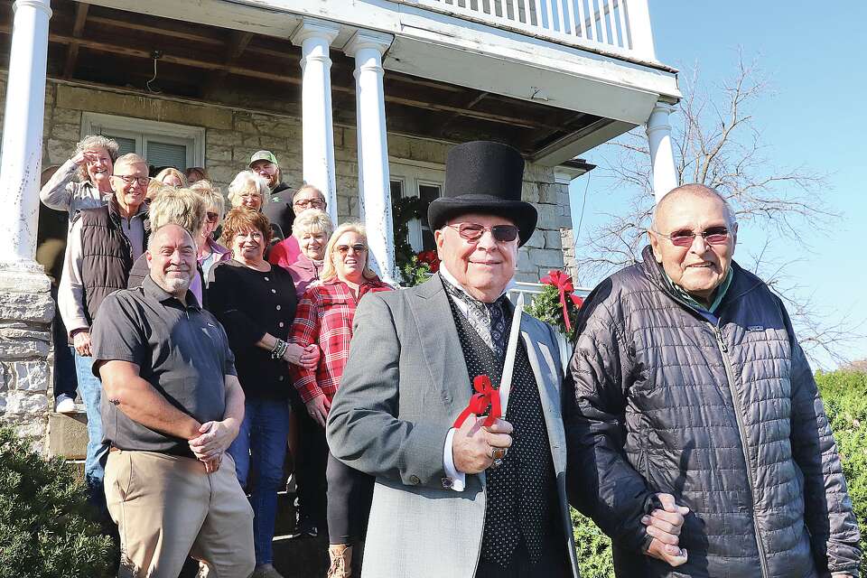 Godfrey Mayor McCormick battles neuropathy, uses walker for strength