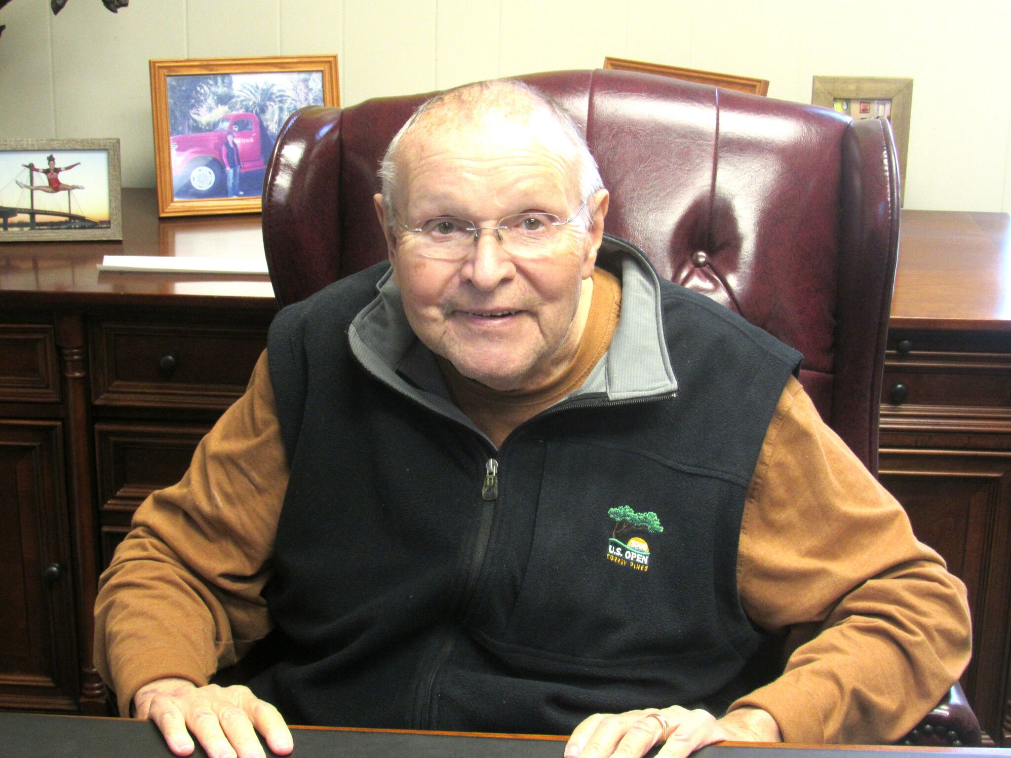 Godfrey Mayor McCormick battles neuropathy, uses walker for strength