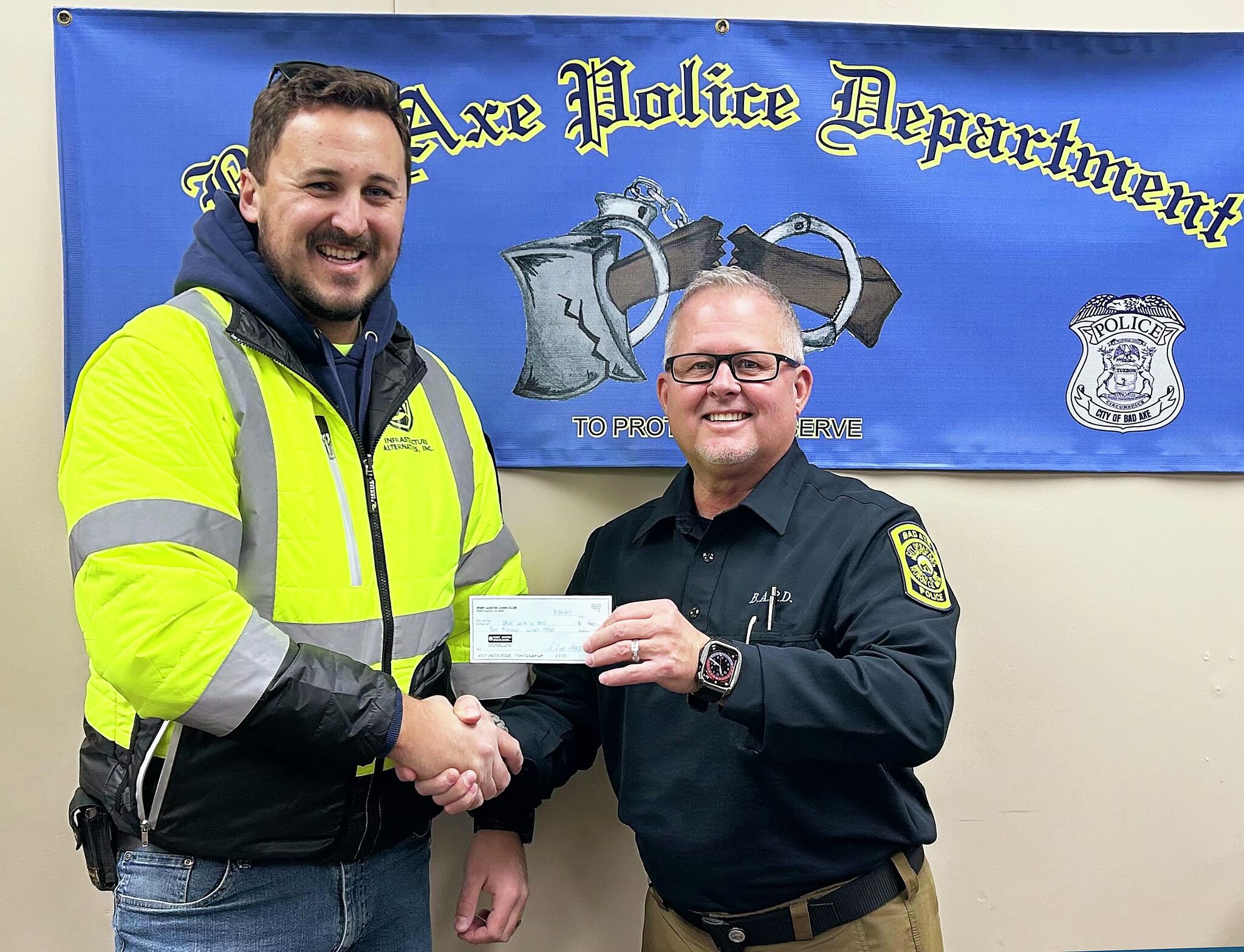 Port Austin Lions Club donates $4,000 to Shop with a Hero