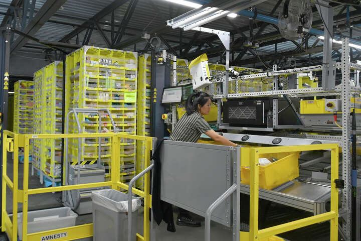 Behind the scenes of an Amazon warehouse when customers buy items