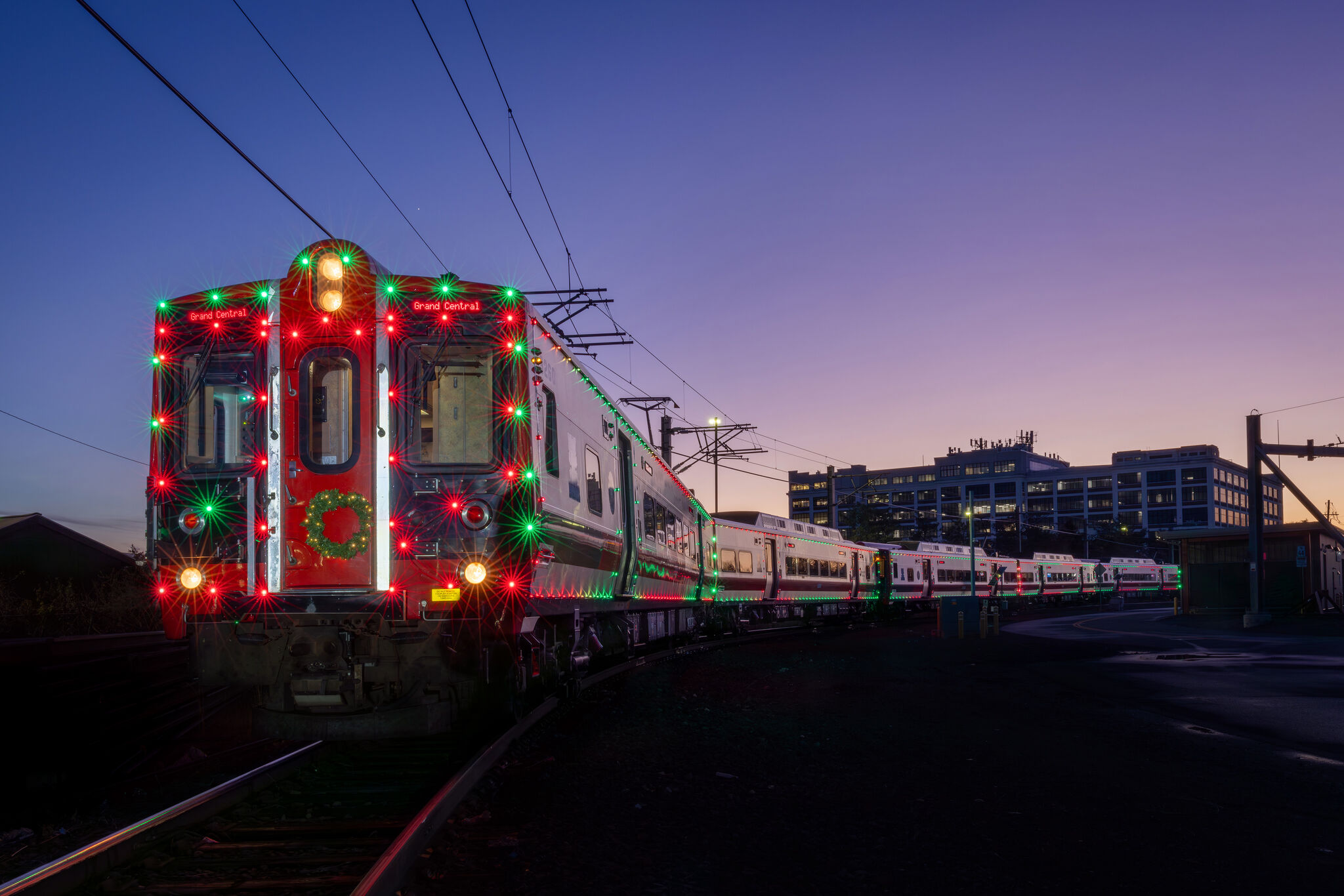 Metro North unveils its first-ever holiday lights train