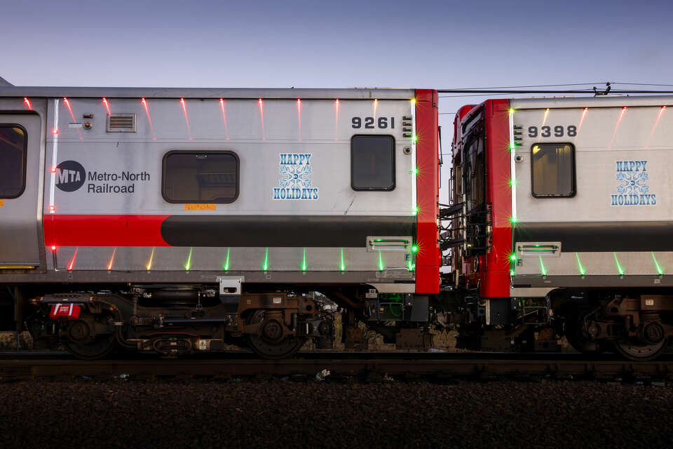 Metro North unveils its first-ever holiday lights train