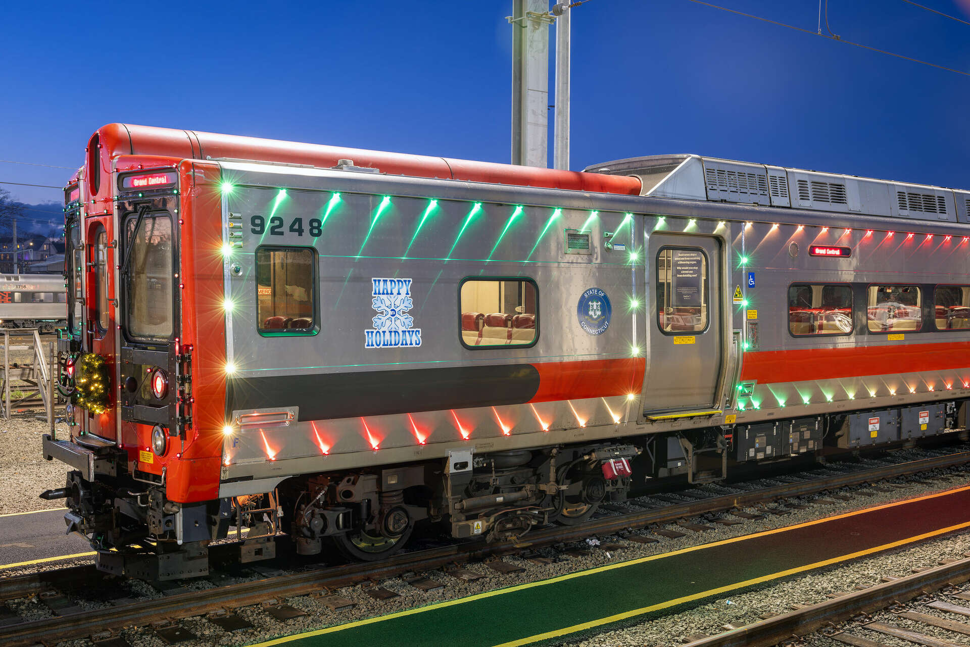 Metro North unveils its first-ever holiday lights train