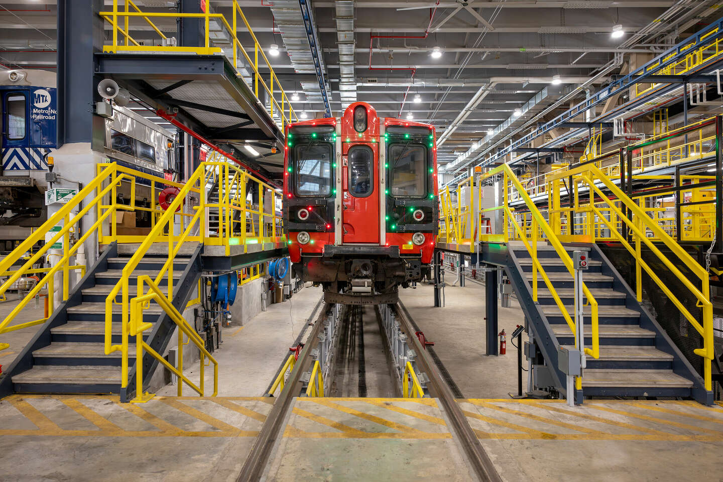 Metro North unveils its first-ever holiday lights train