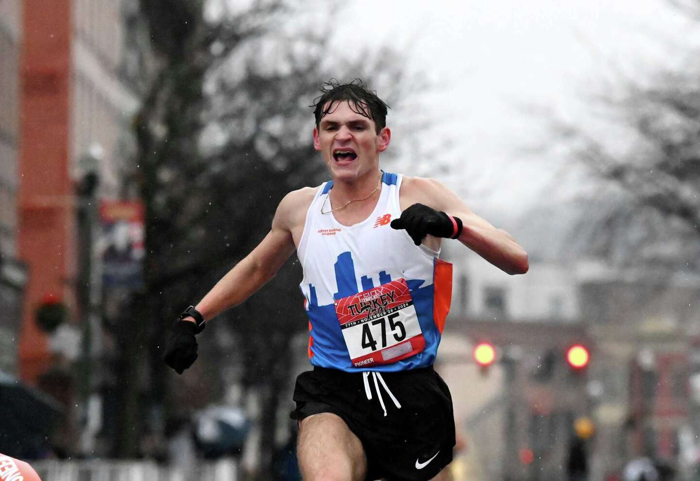Photos: A wet, cold Troy Turkey Trot