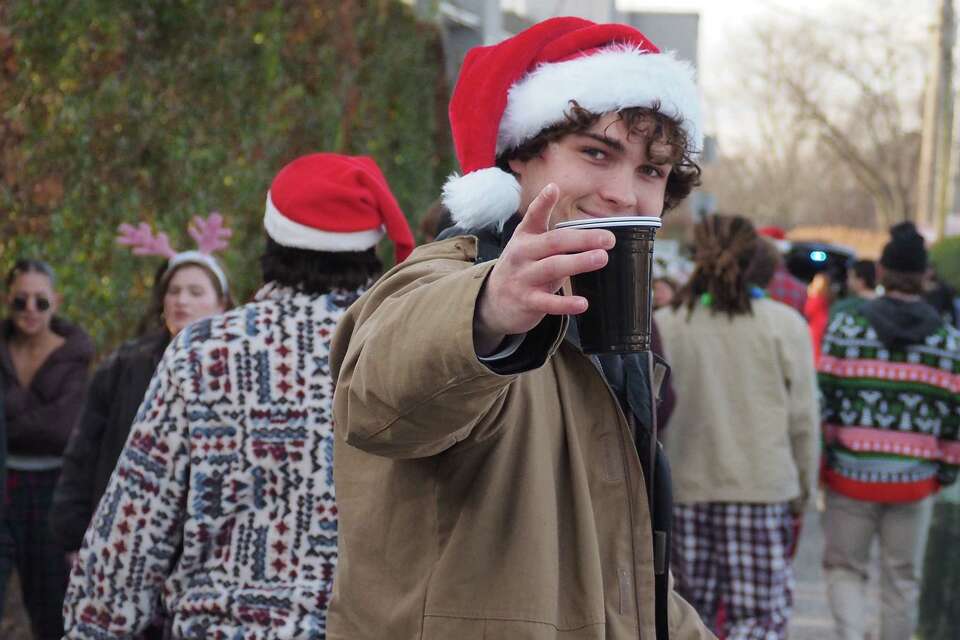 In photos: Thousands crowd beach for Fairfield's SantaCon
