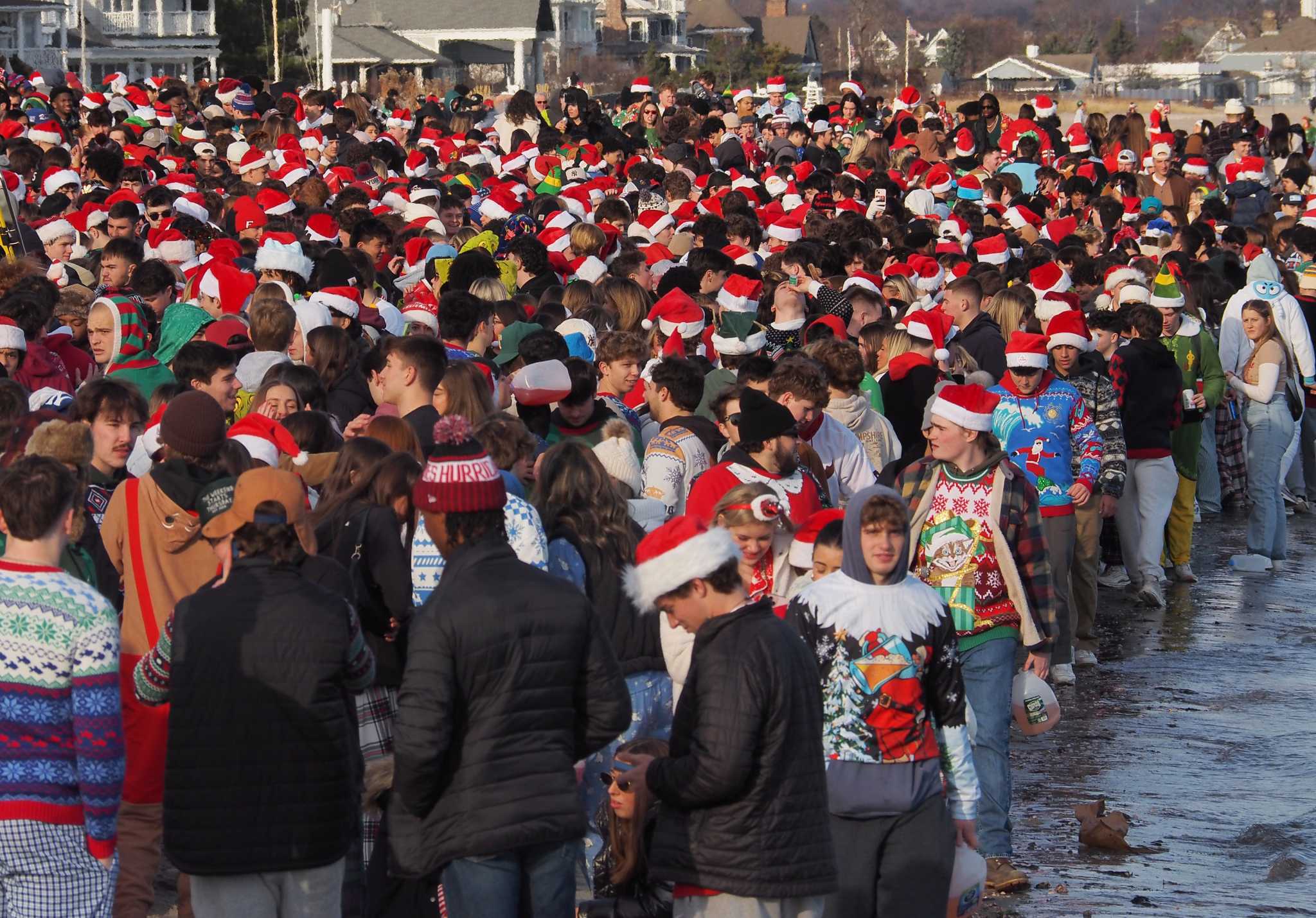 Fairfield officials estimate 20K people filled beach area for SantaCon