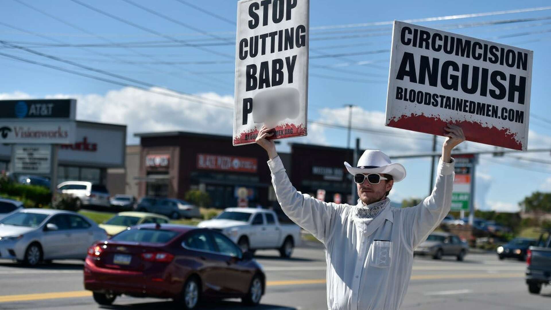 Bloodstained Men protest circumcision in the Texas Hill Country