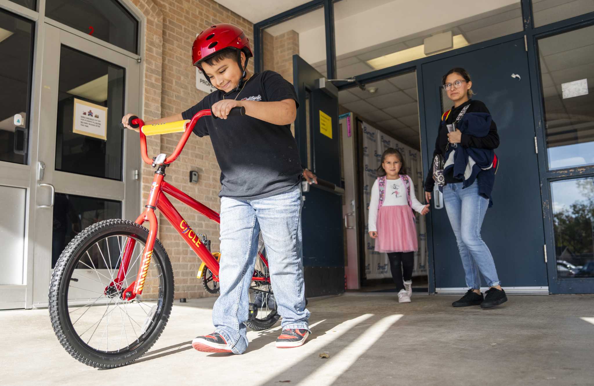 Burnett Elementary students earn bikes through science of reading