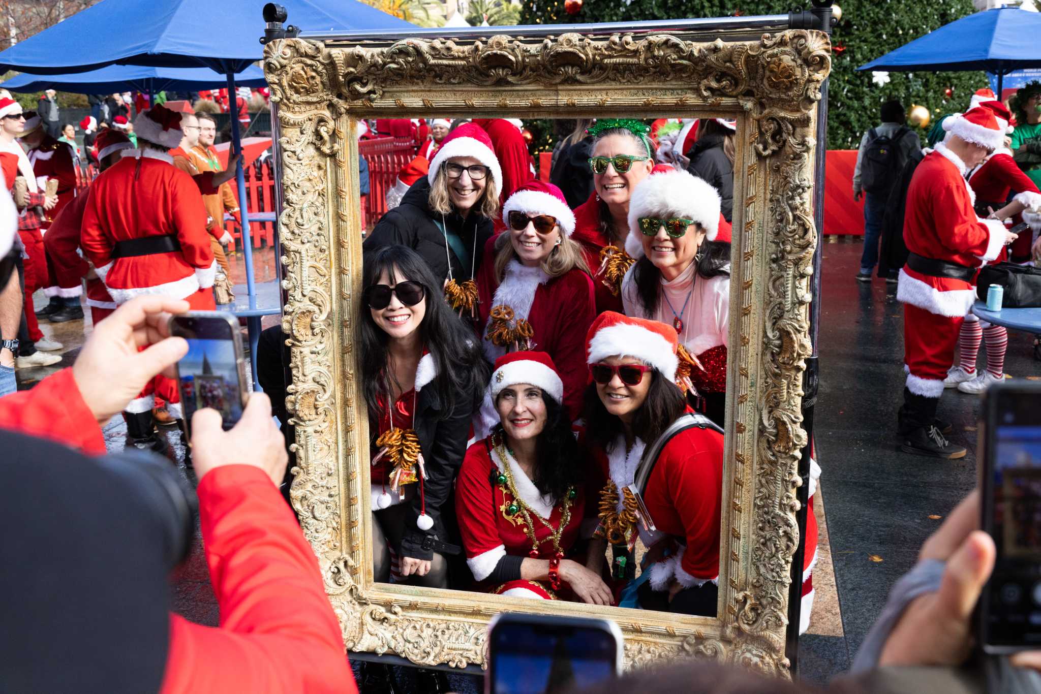 ‘Here to sleigh’: Nice turnout at SF SantaCon despite naughty weather