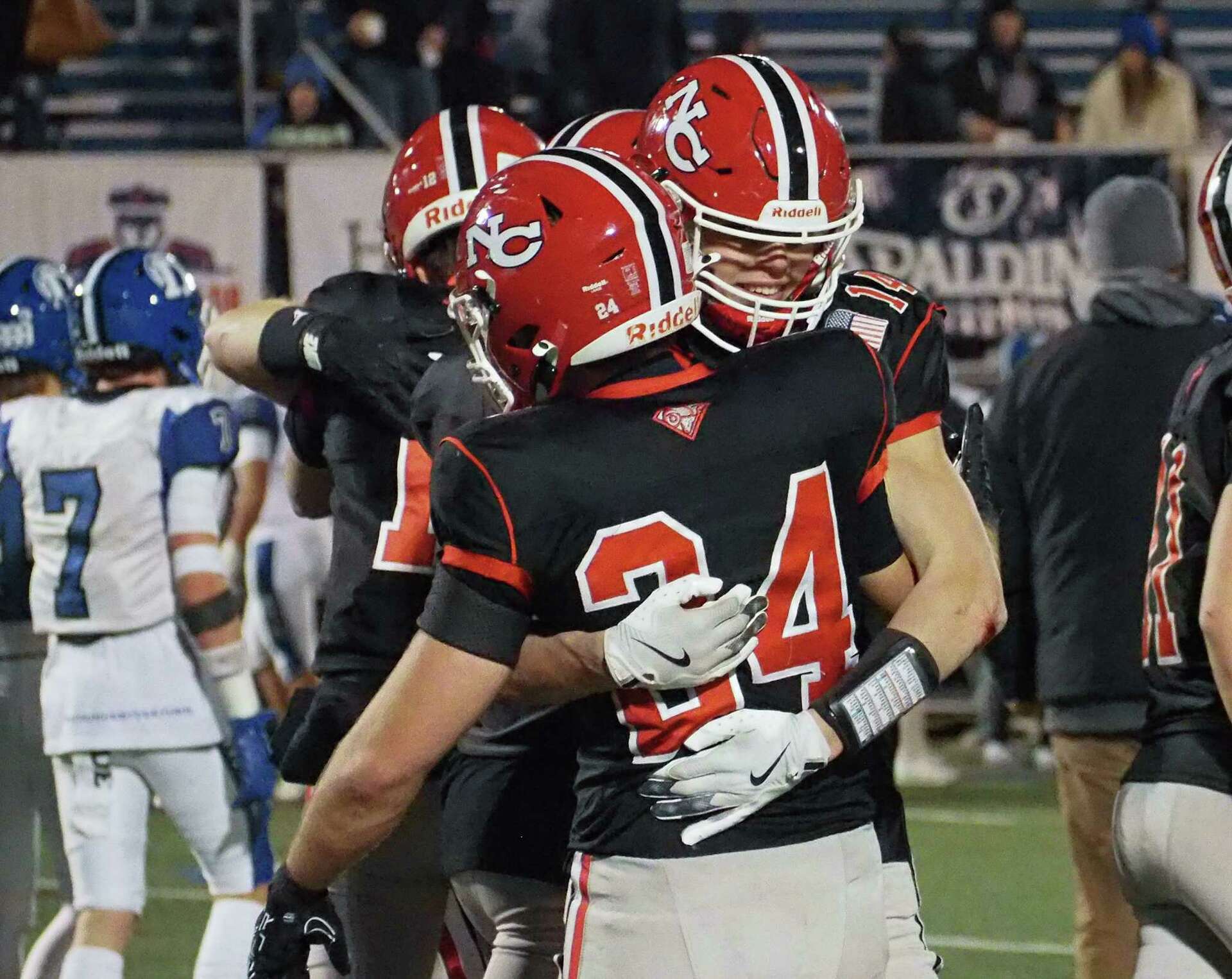 New Canaan holds off Darien for 15th CIAC football championship