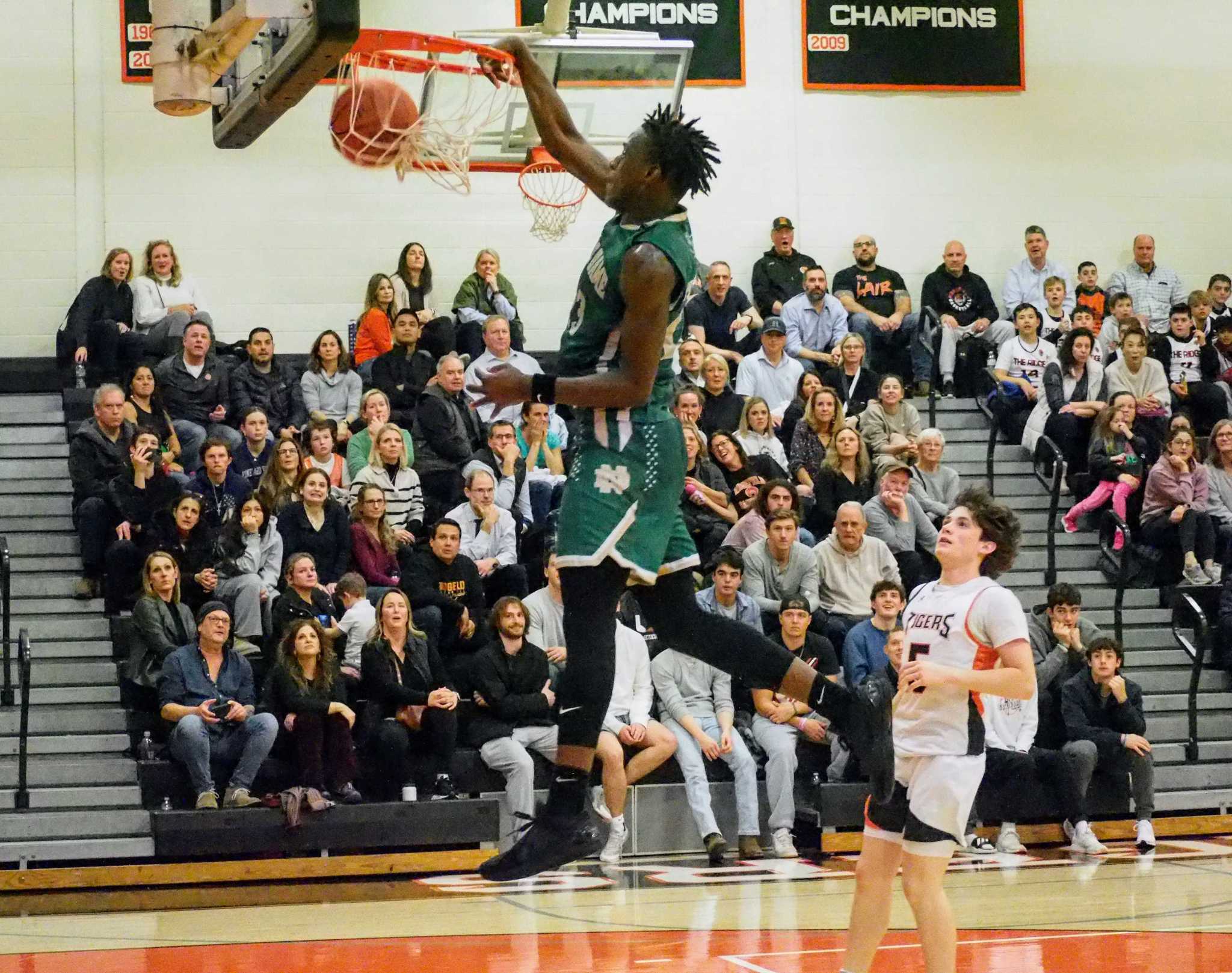 Notre Dame-West Haven vs. Ridgefield high school basketball photos