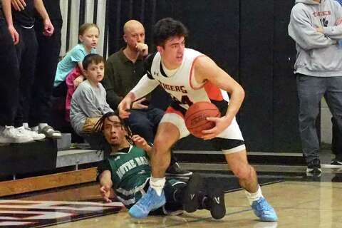 Notre Dame-West Haven vs. Ridgefield high school basketball photos