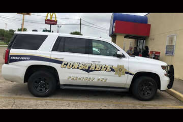 How to tell Tilman Fertitta security from Harris County constable cars