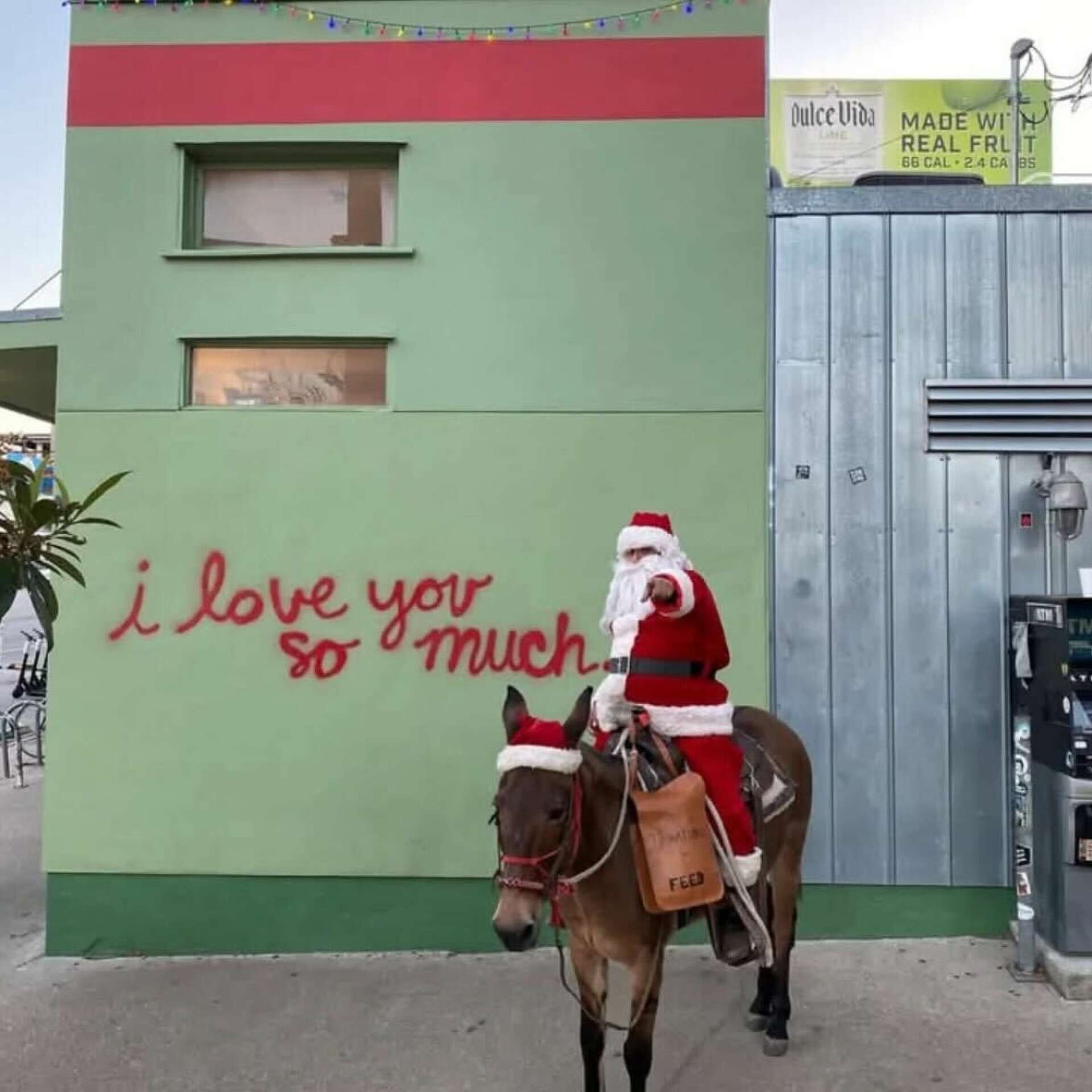 Santa rides horse past Cybertruck in festive Austin moment