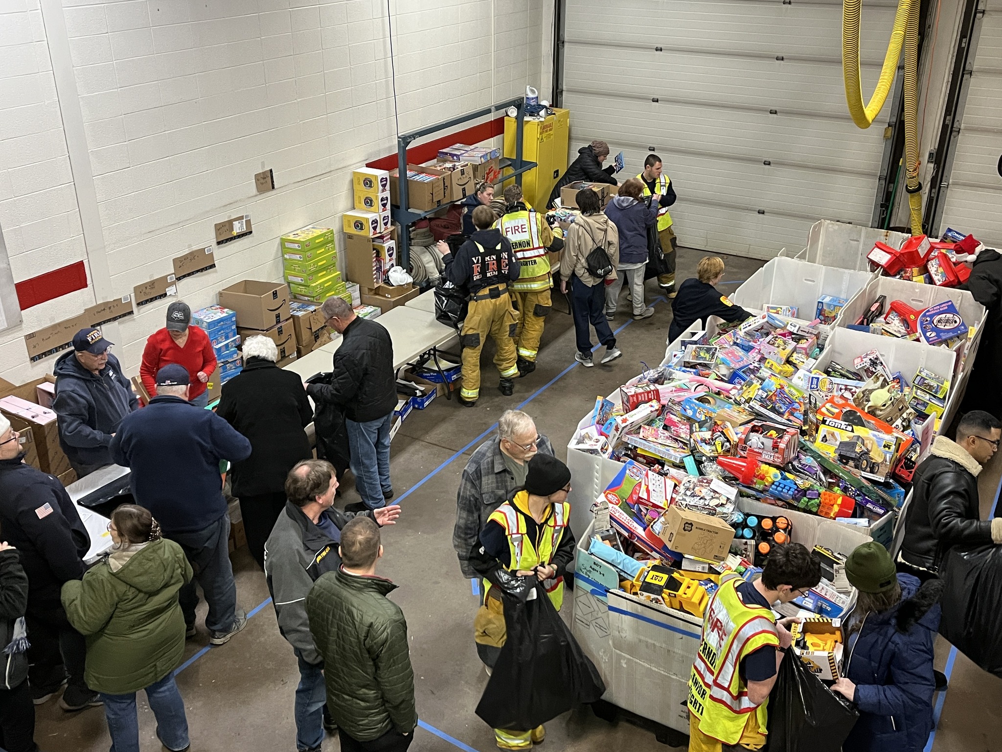 Vernon distributes thousands of toys to hundreds of children in need