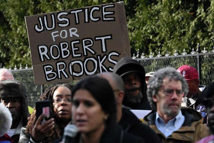 Who was Robert L. Brooks, the man beaten by New York prison officers?