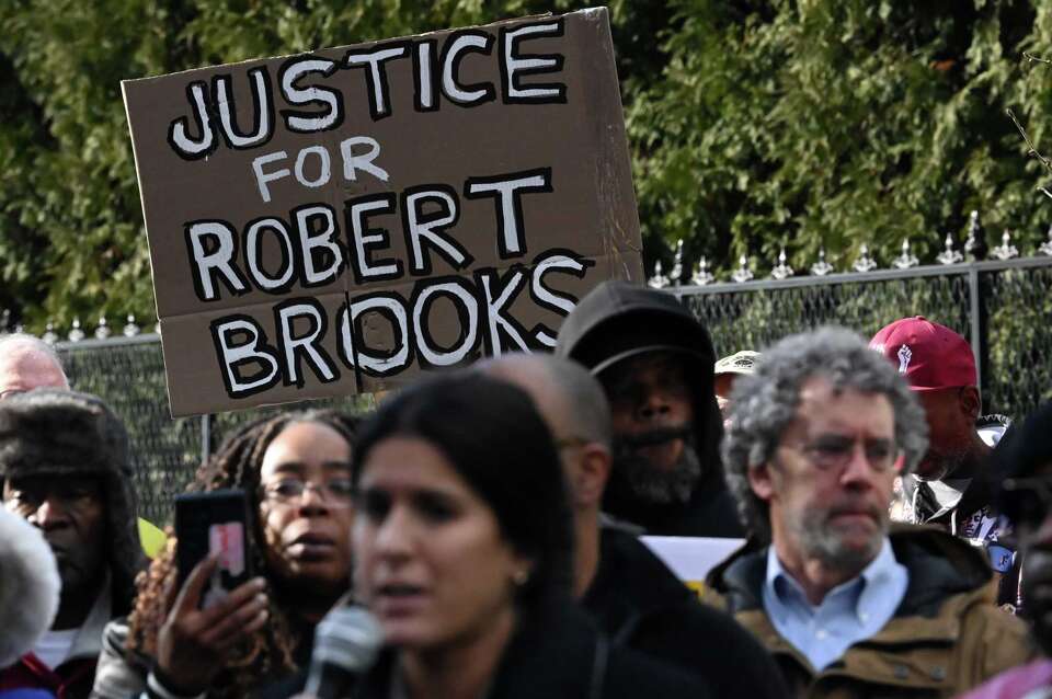 Who was Robert L. Brooks, the man beaten by New York prison officers?