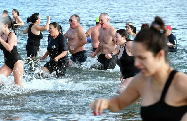 In photos: 'Freezin' for a Reason' Polar Bear Plunge in Westport
