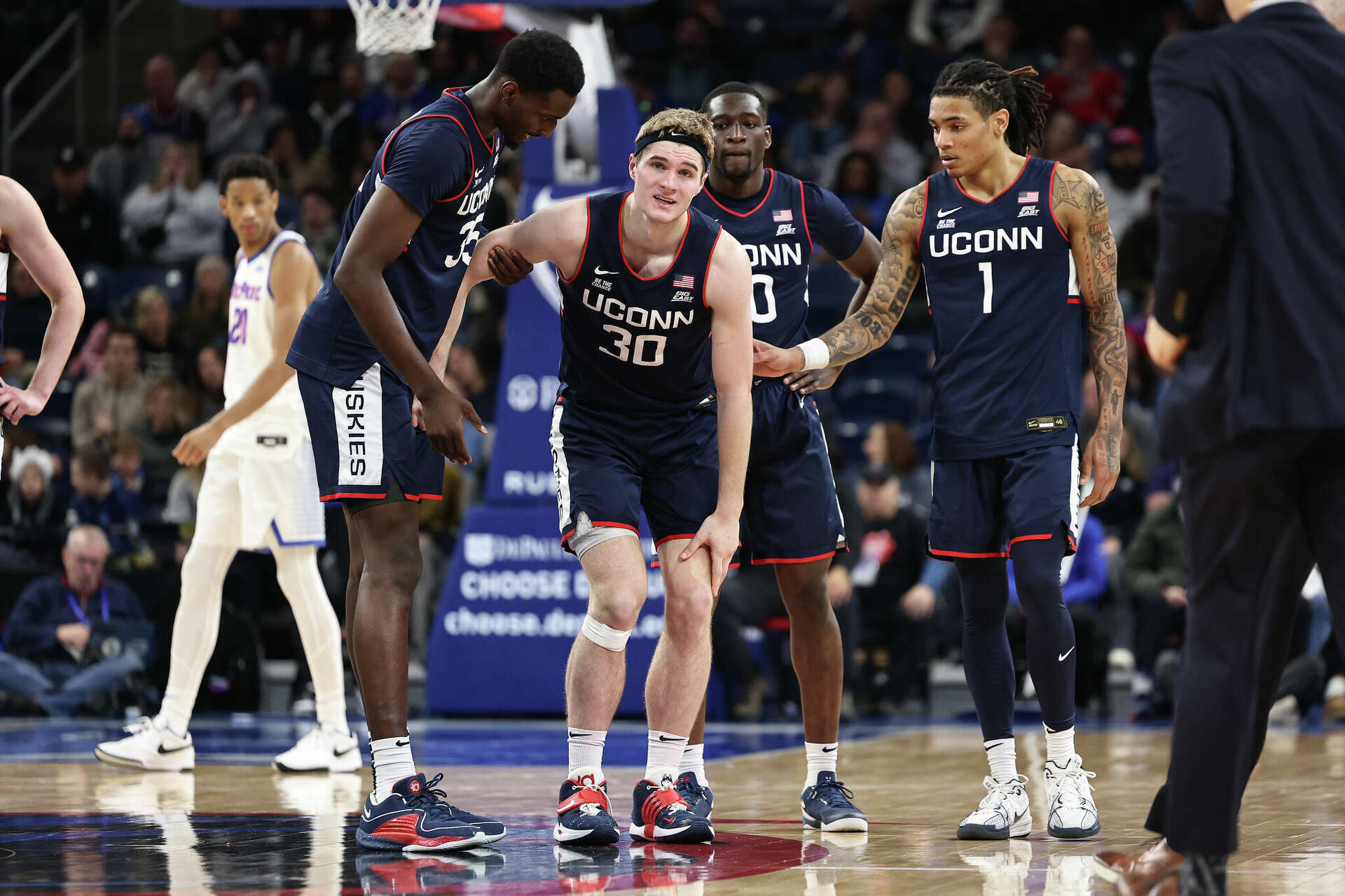 UConn's Liam McNeeley out 'weeks, not days' with high ankle sprain