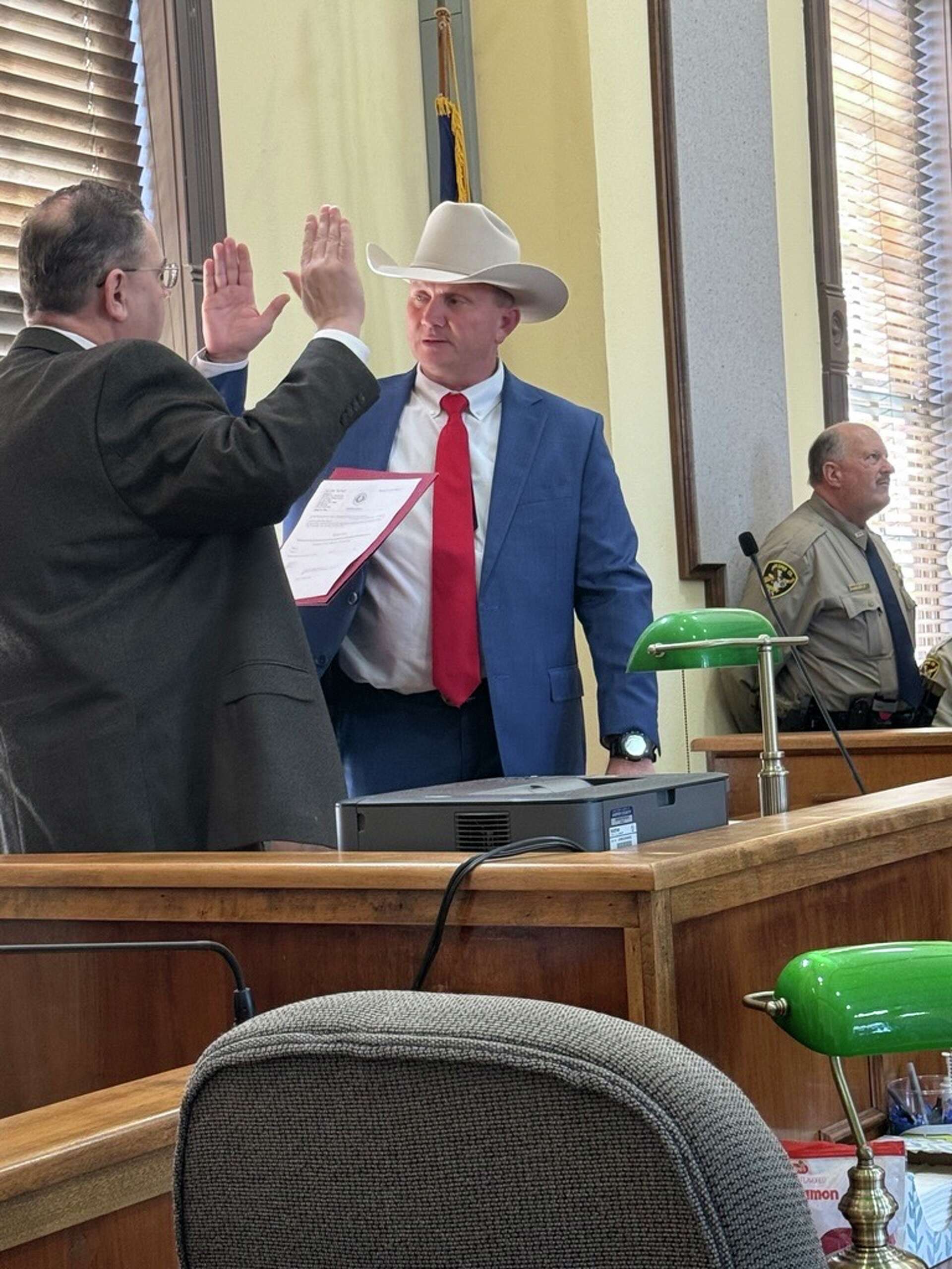 Father and son sworn in as sheriffs of Jasper and Newton Counties
