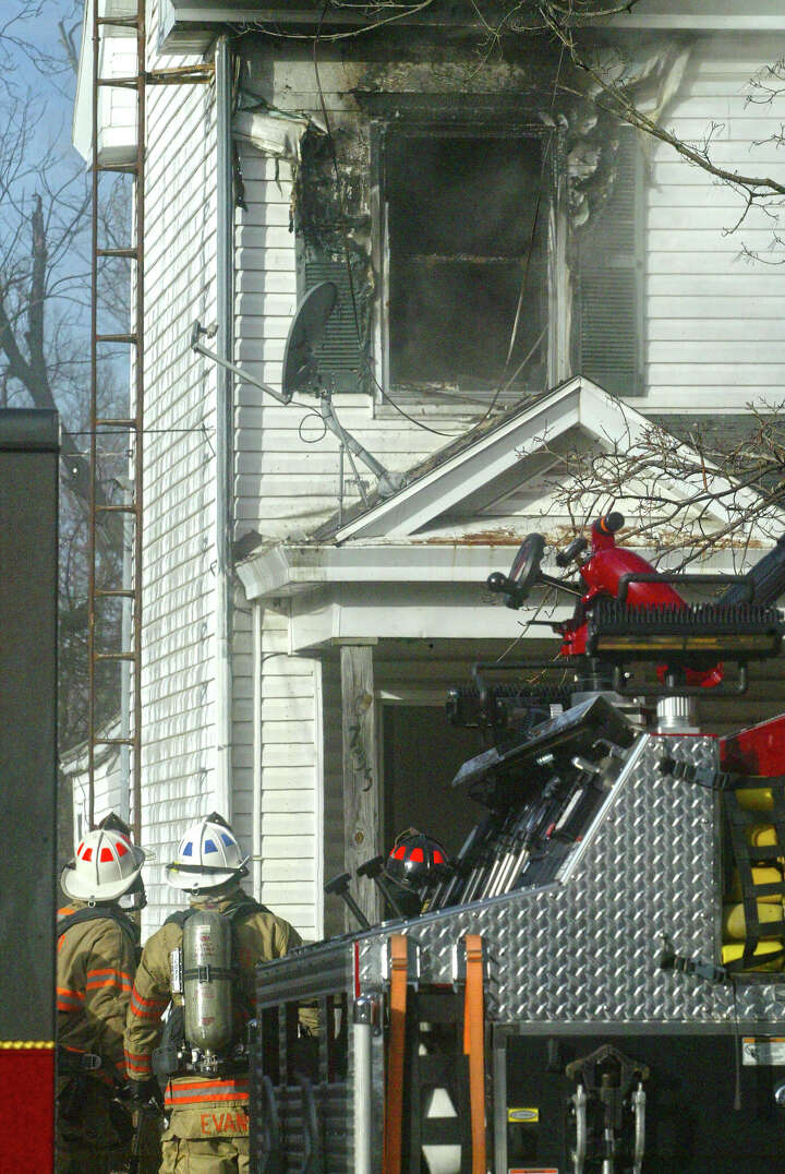Firefighters quickly contain fire in attic of house