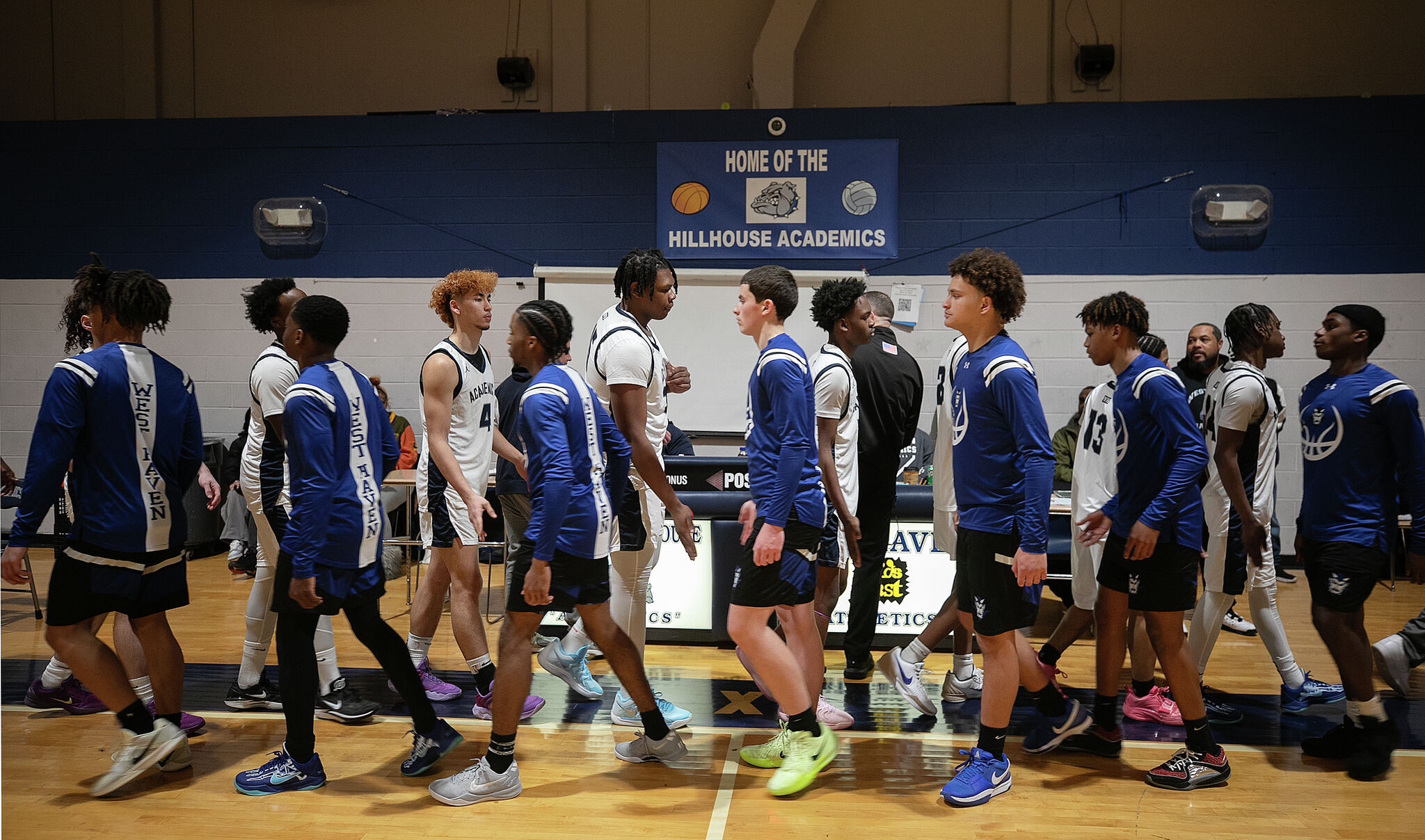 Some CT HS basketball teams shaking hands before games, not after
