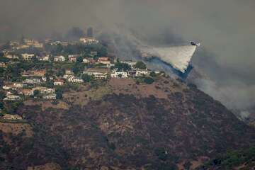 L.A. wildfires: Brentwood, Encino evacuated as Palisades Fire shifts