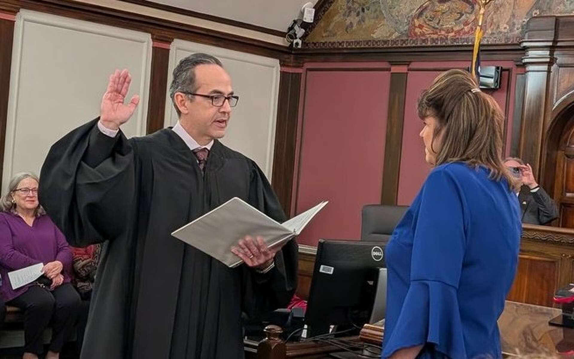 People packed the courtroom for Angela M. Cole's investiture Friday
