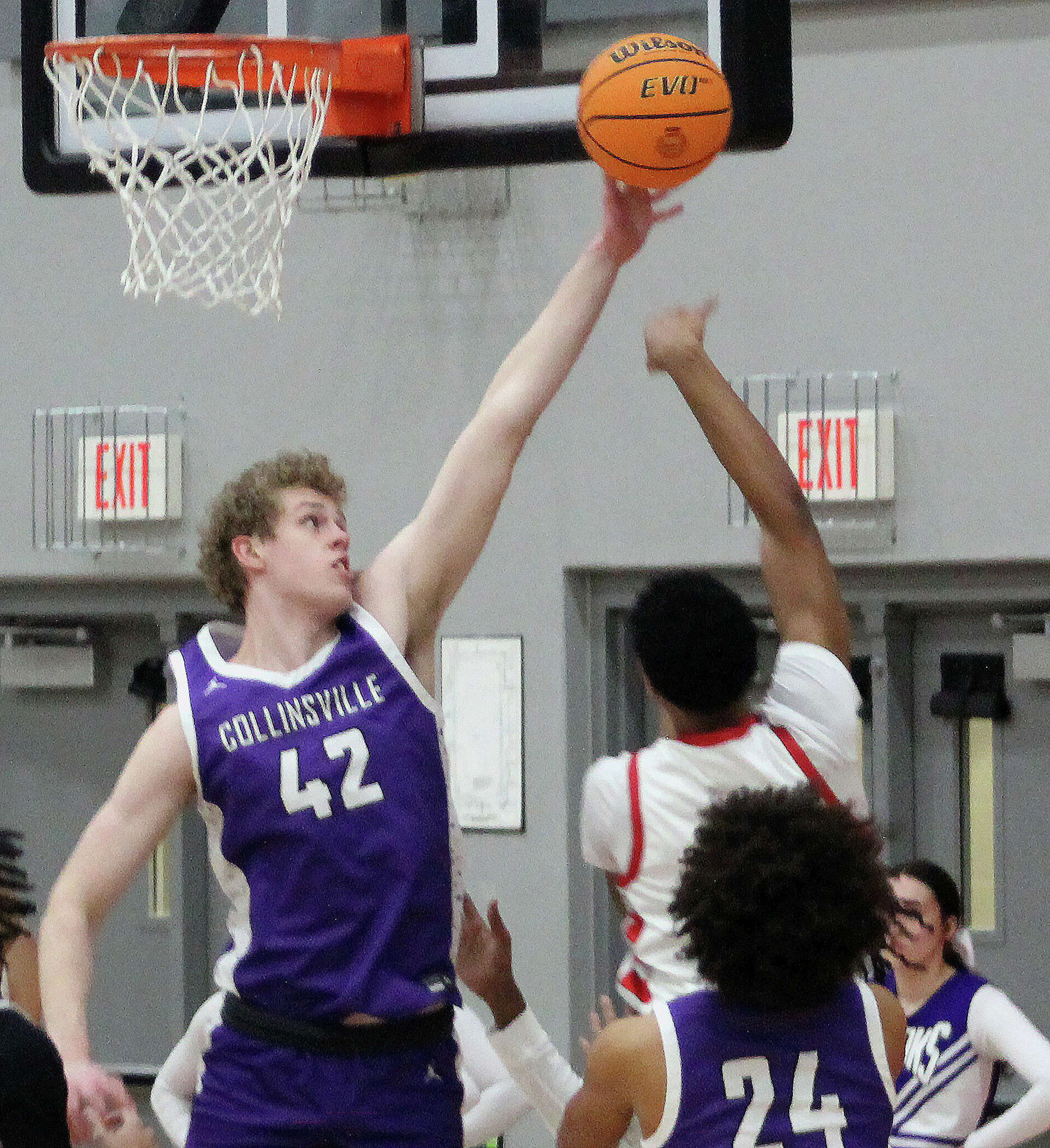 Alton basketball falls to Collinsville in OT after leading by 12
