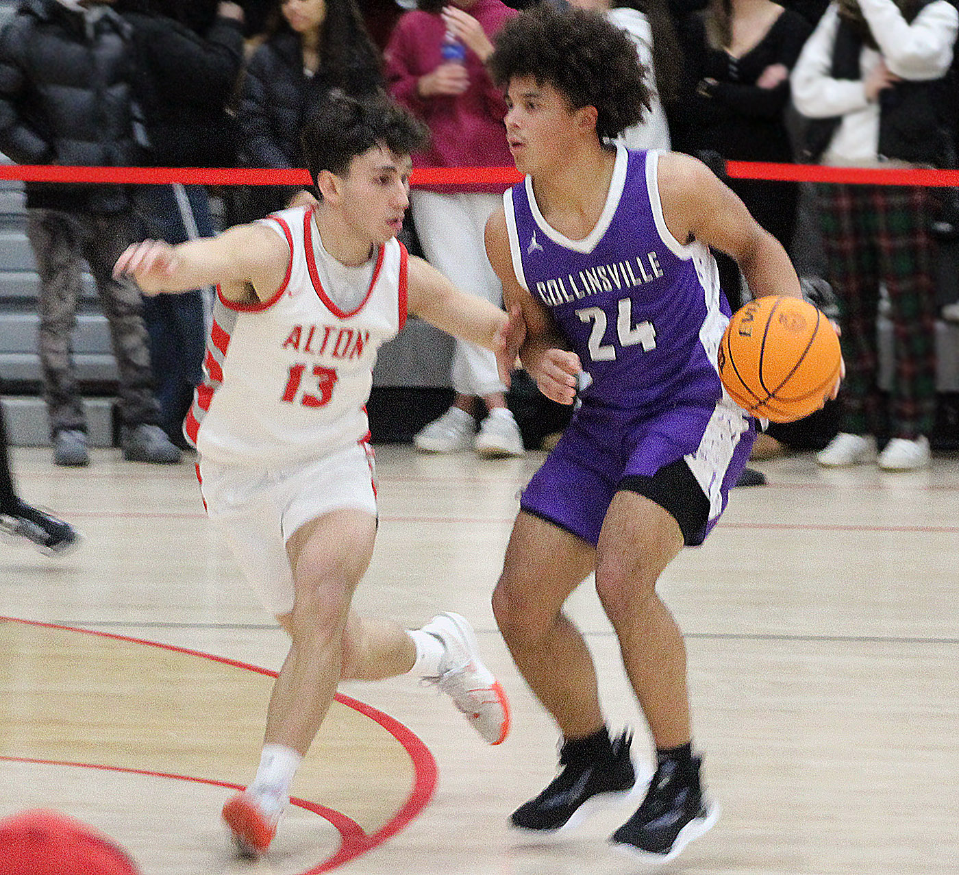Alton basketball falls to Collinsville in OT after leading by 12