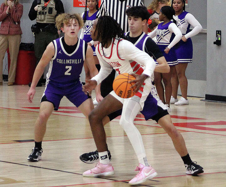 Alton basketball falls to Collinsville in OT after leading by 12