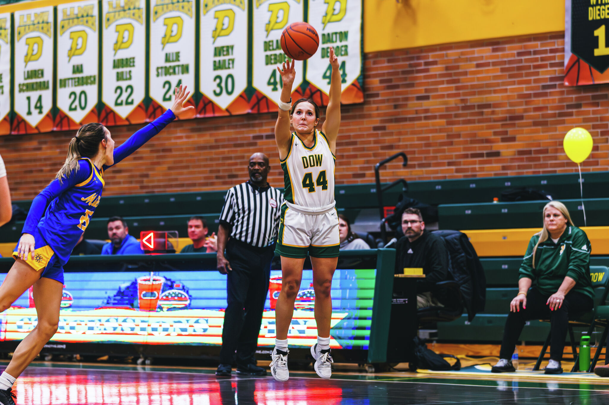 Dow girls win big, boys fall