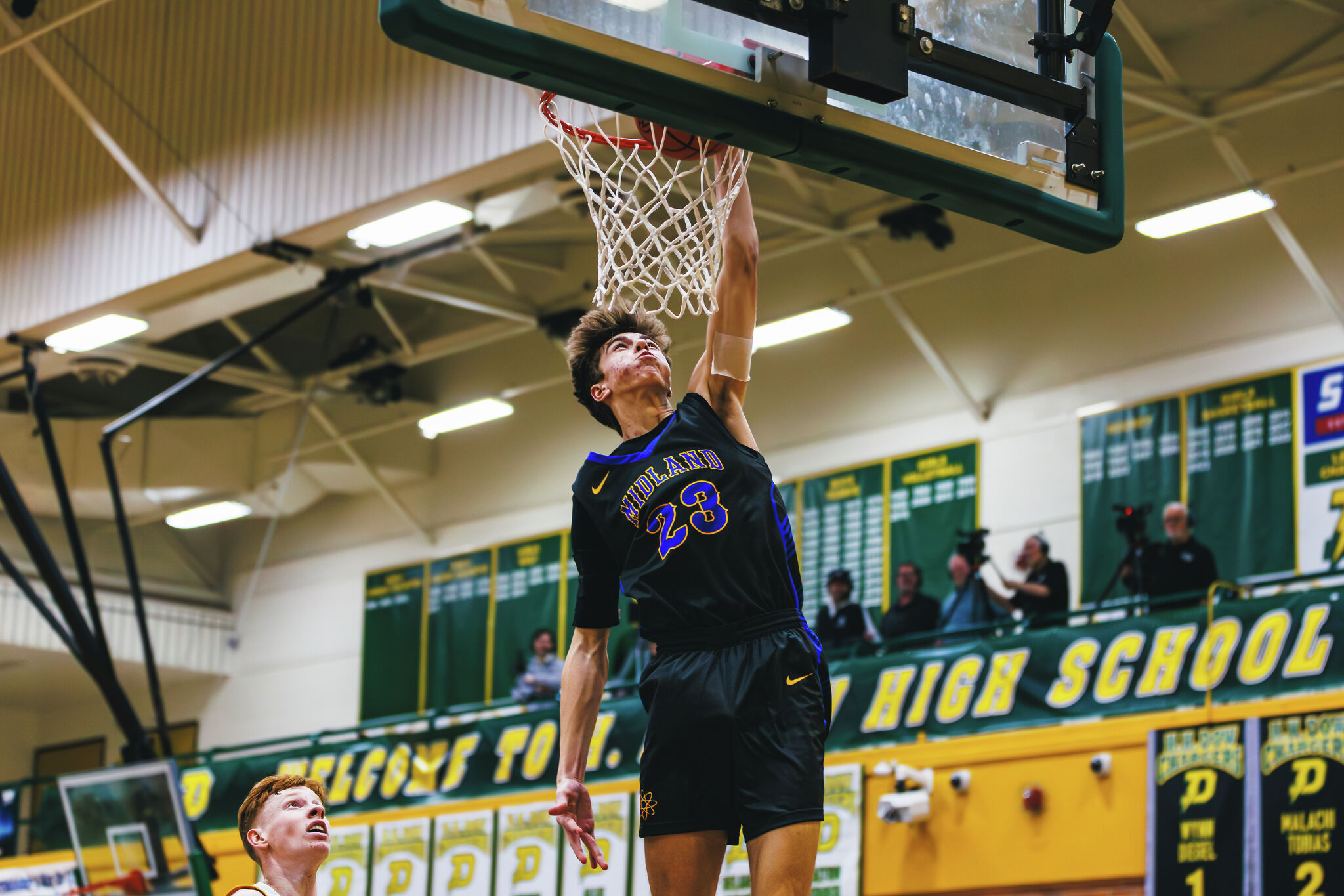 Dow girls, Midland boys win