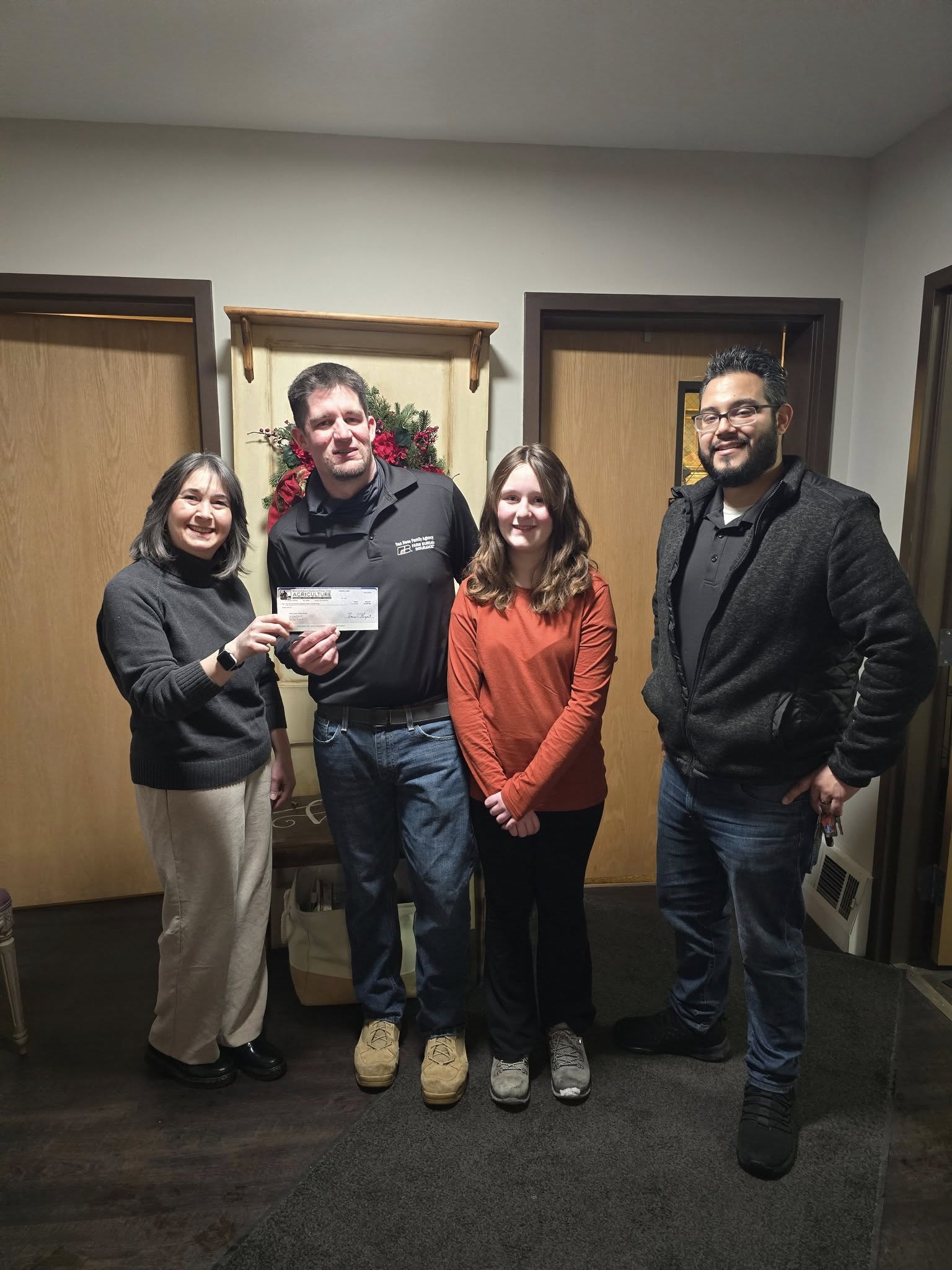 Farm Bureau Insurance awards grant to Midland’s Open Door