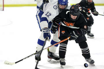 Darien High School hockey defeats Ridgefield photo gallery