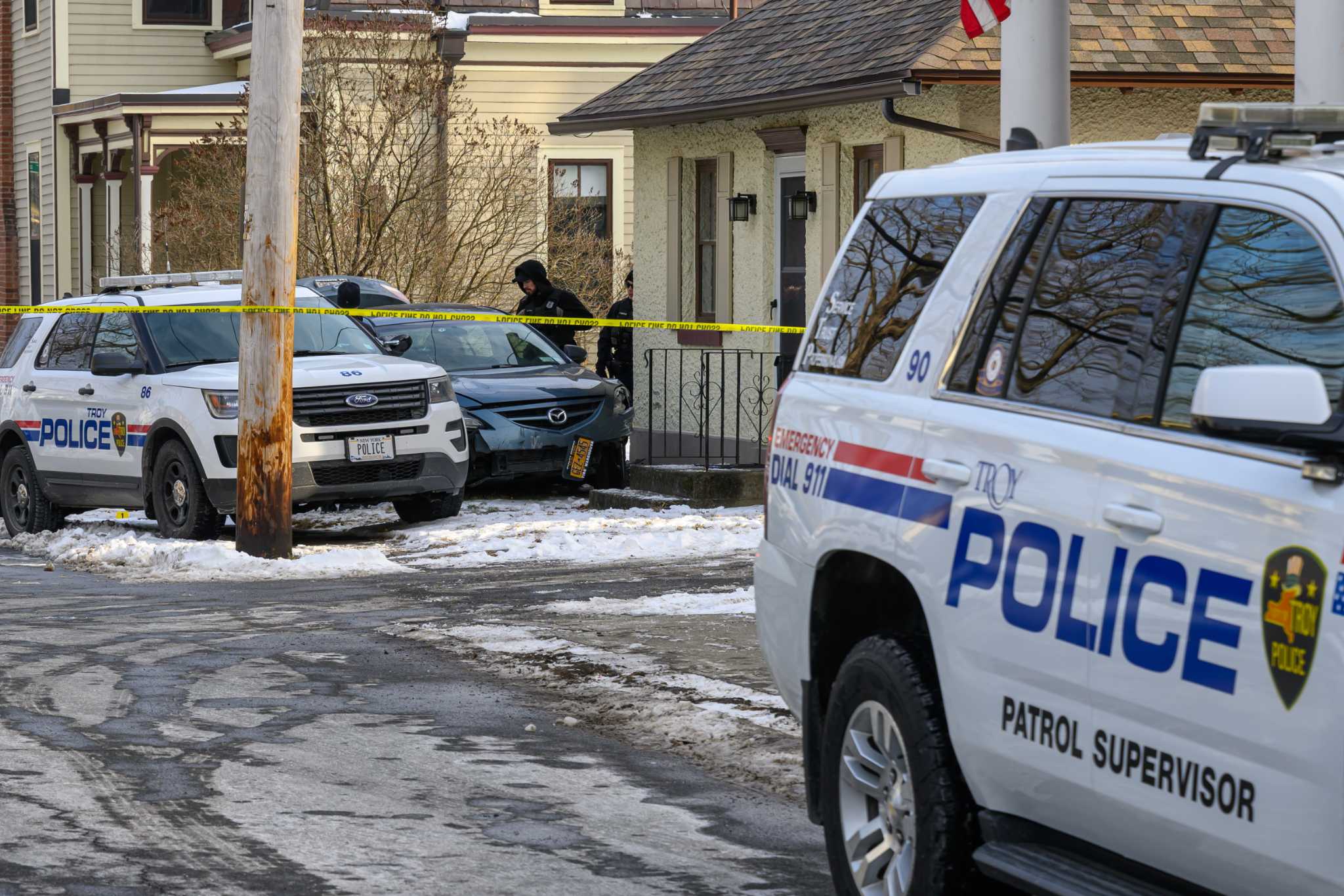 Troy police name suspect, officer involved in car chase, shooting