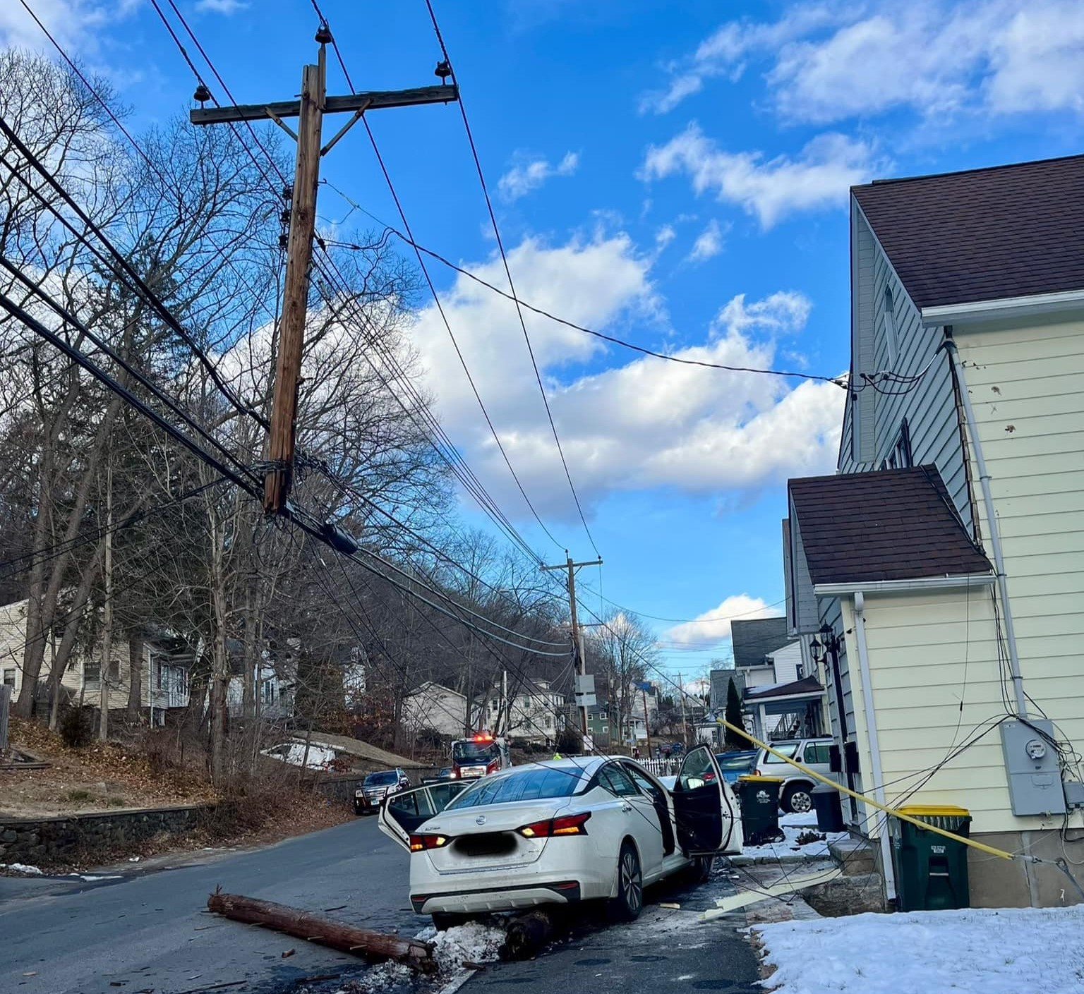 Ansonia officials: Car crashes into telephone pole, snaps it in half