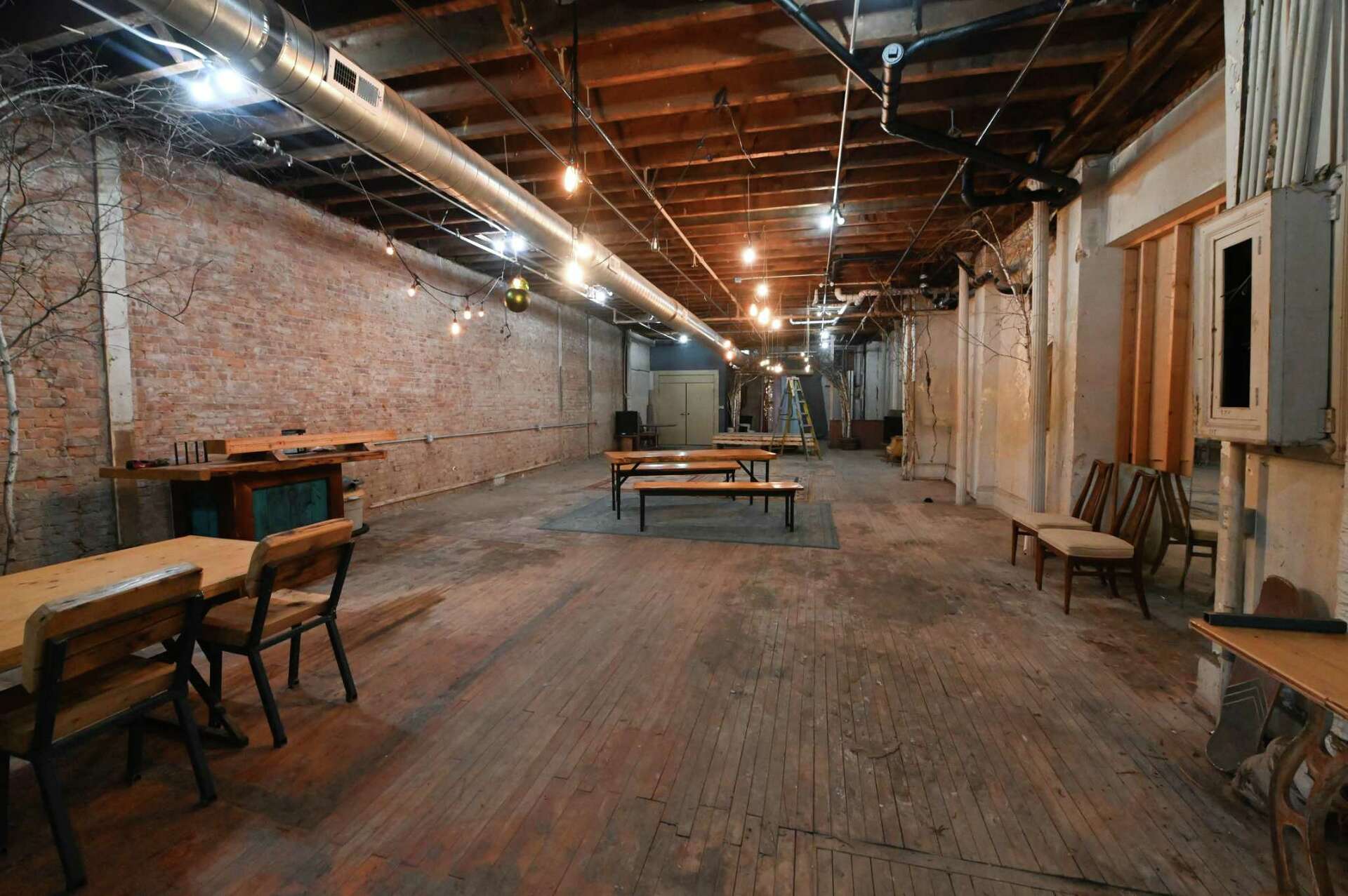 Troy artist, businessman changed his life with reclaimed wood