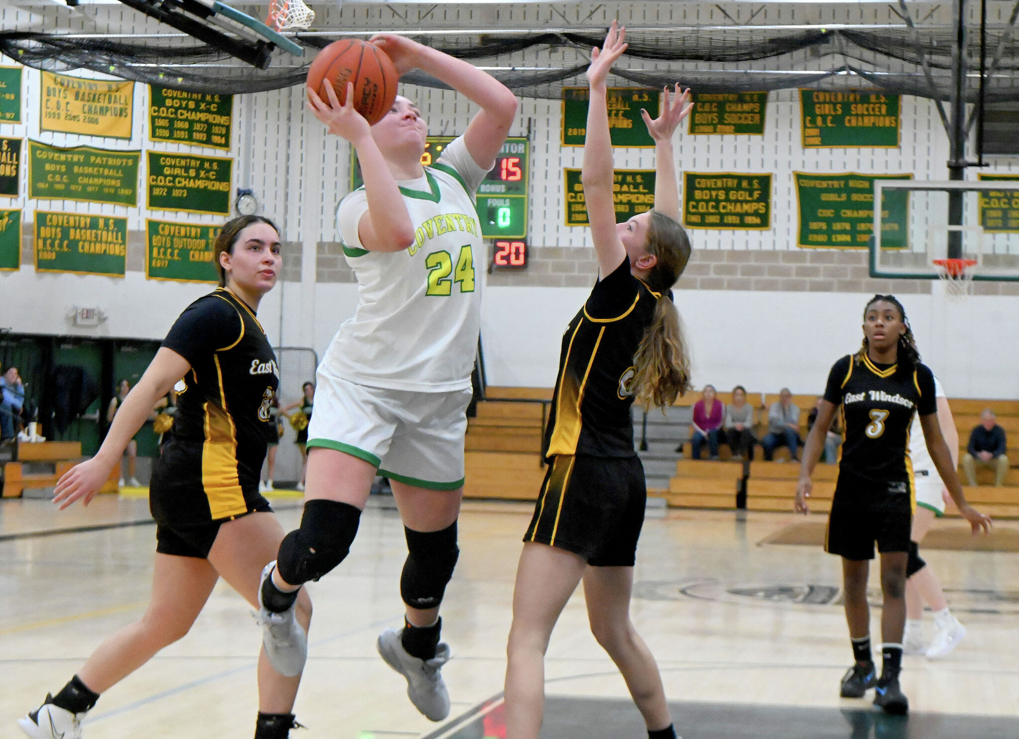 Photos: Coventry girls basketball defeats East Windsor