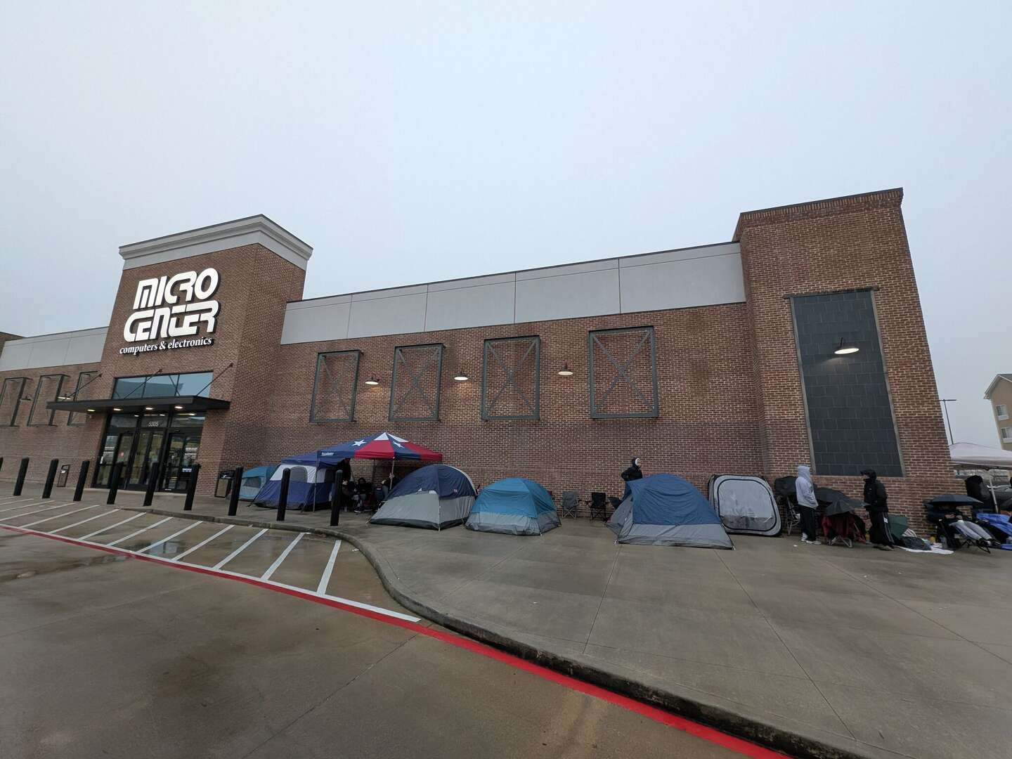 Why are people camping outside the Houston Micro Center?