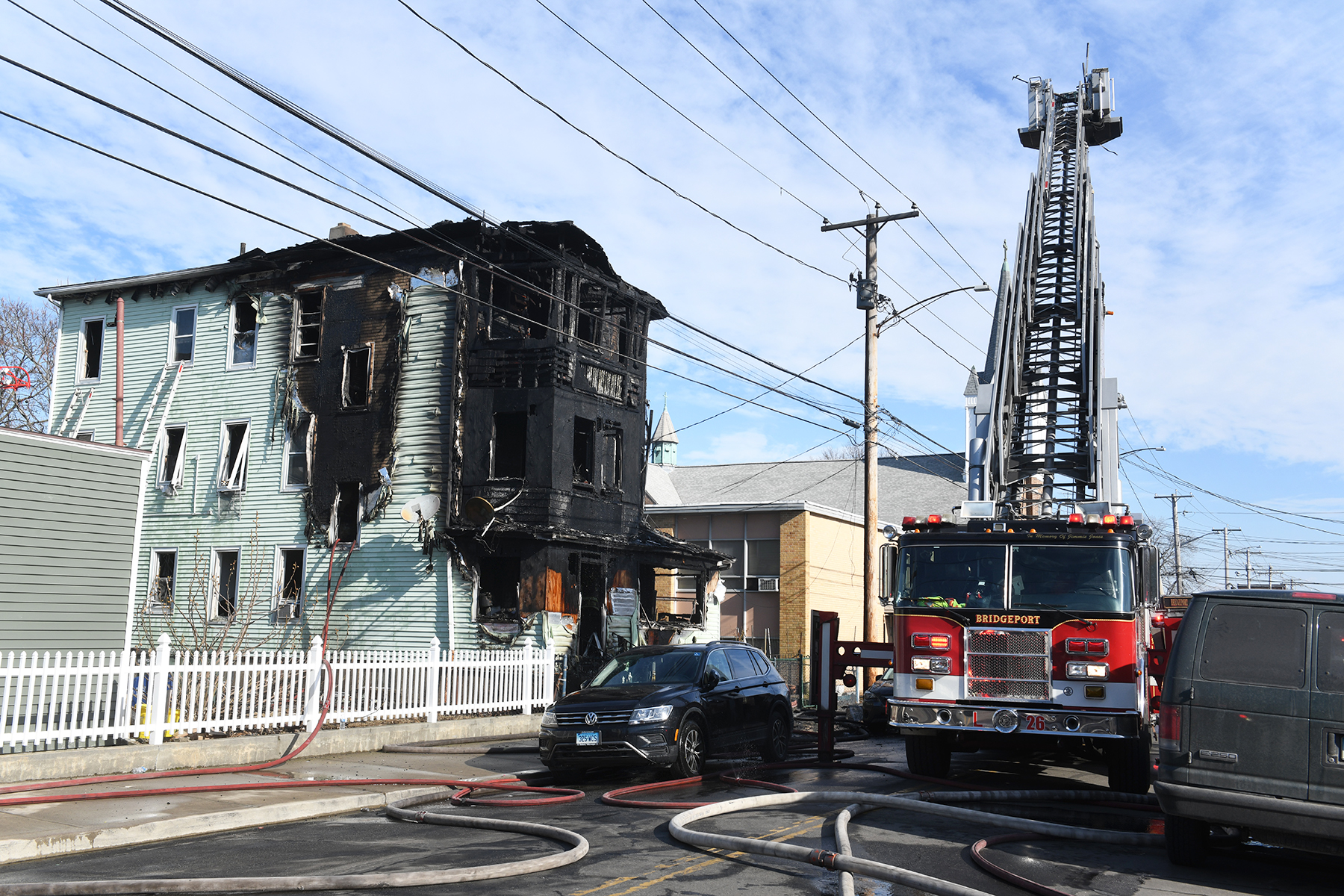Bridgeport fire damages three-story home on Grand Street: Officials